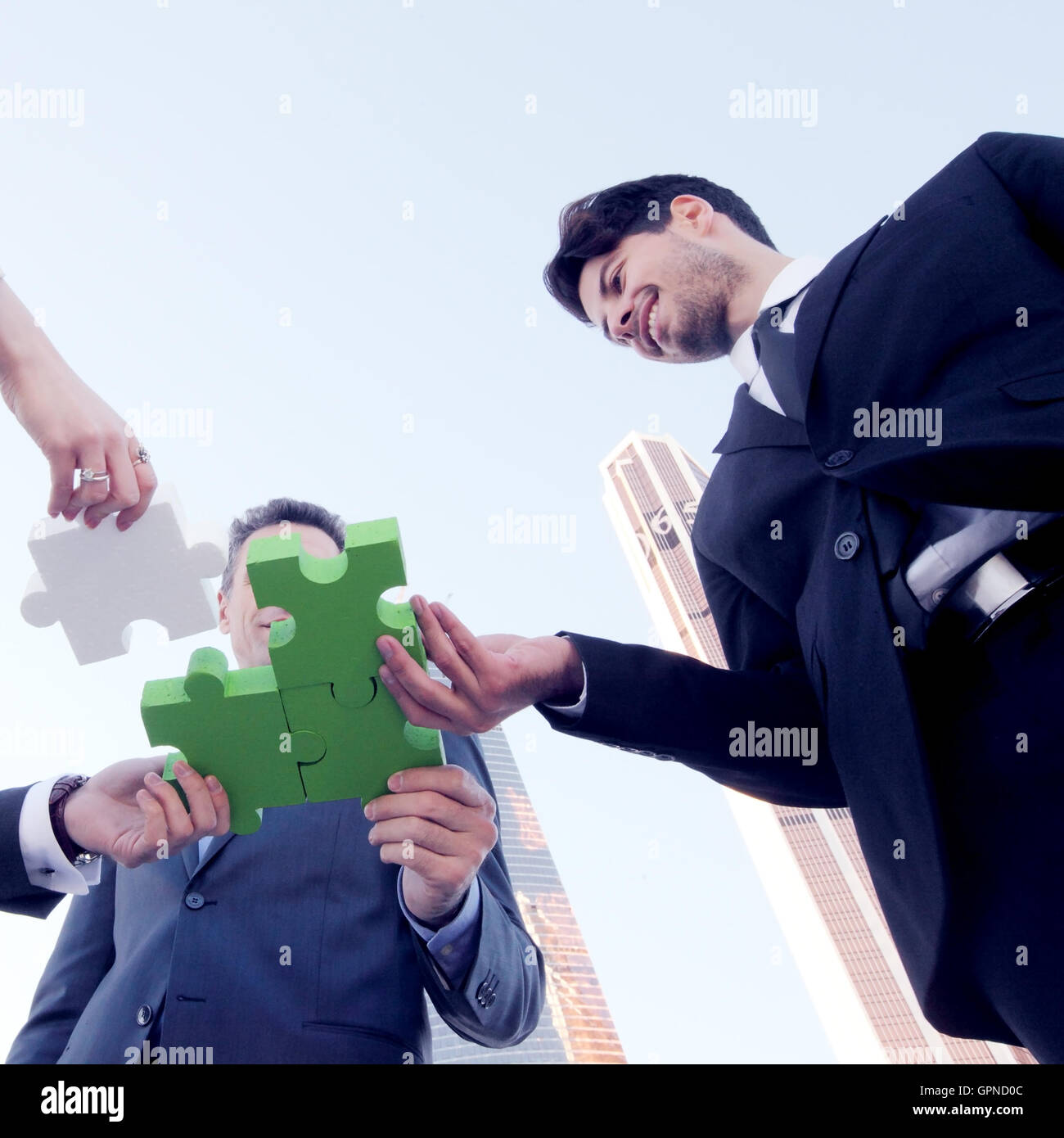 Business people puzzle hi-res stock photography and images - Alamy