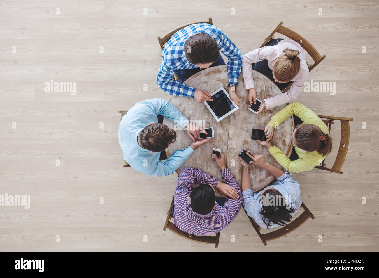 Group of diverse people using digital devices Stock Photo - Alamy