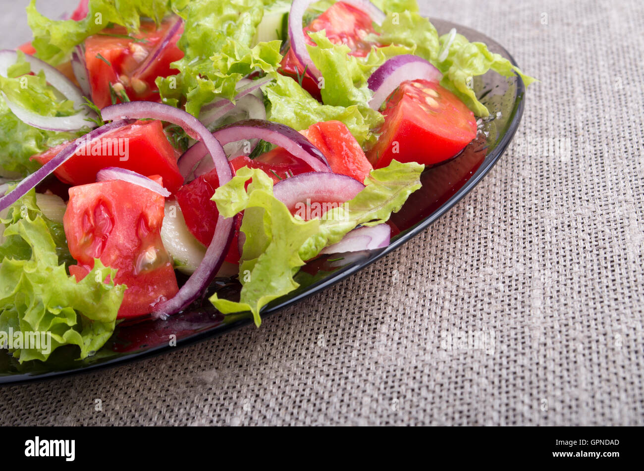 Background food styling - side view on a diagonal on a plate with fresh ...