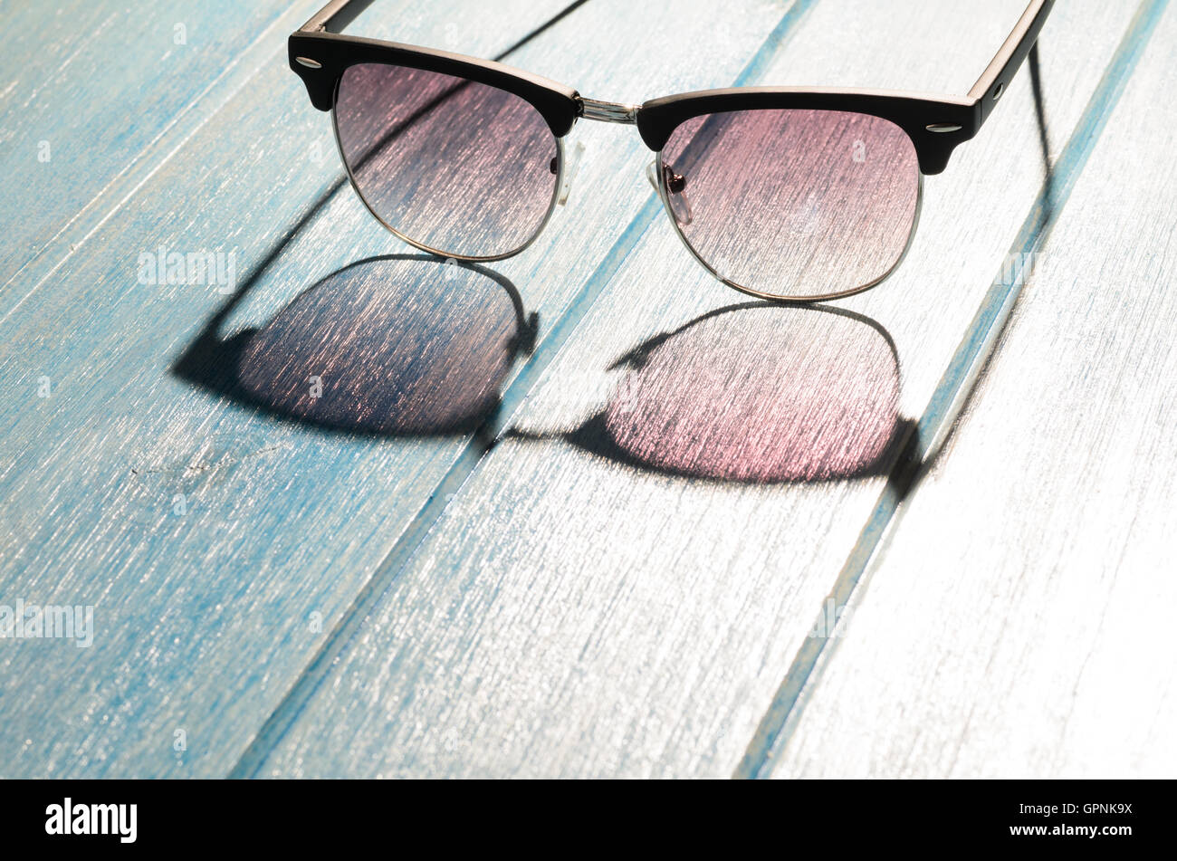 stylish sunglasses on table Stock Photo - Alamy