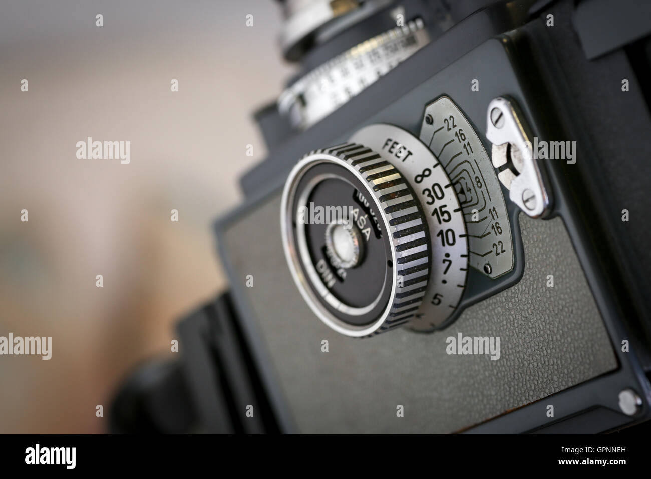 A grey "baby" Rolleiflex twin lens camera using 127 roll film. A high ...
