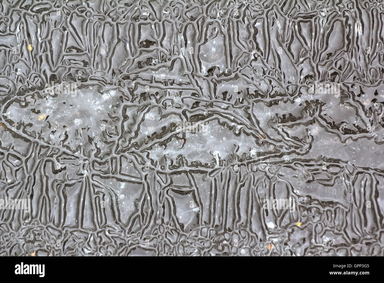 smooth surface of ice. alternation of dark and light shapes, Material ...