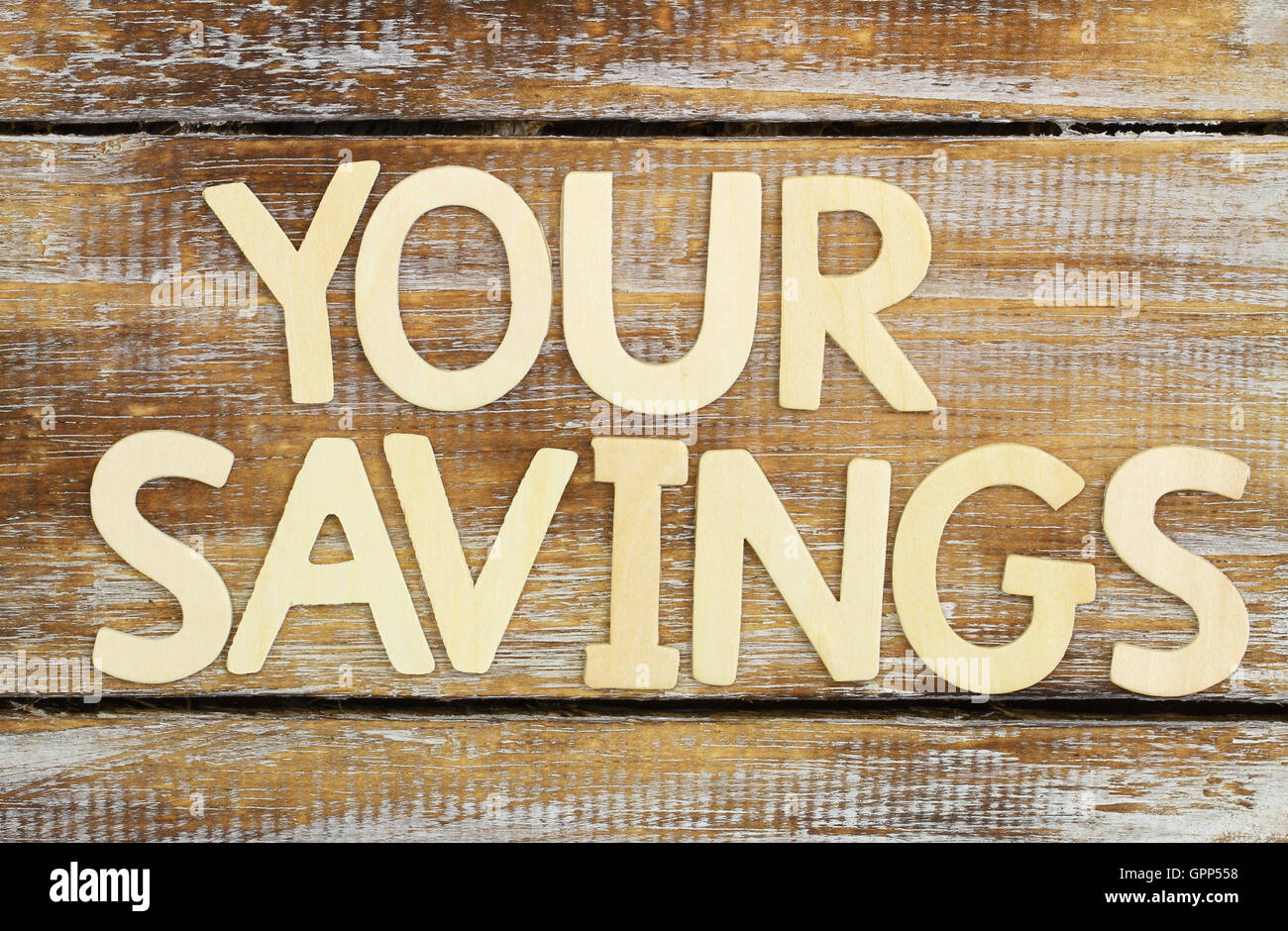 Your savings written with wooden letters on rustic surface Stock Photo ...
