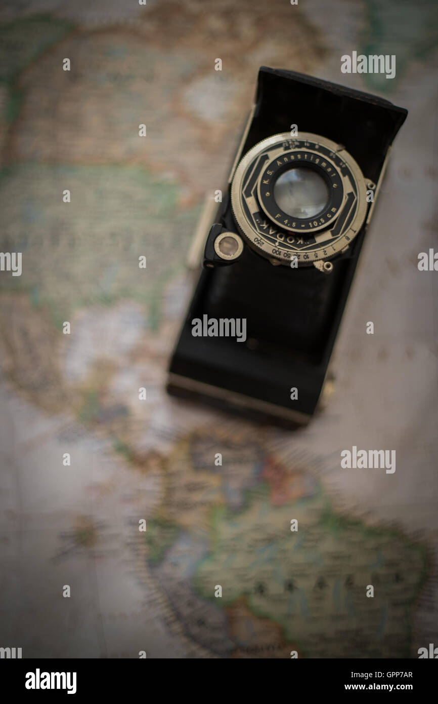 World map with quote in lettered tiles Stock Photo - Alamy