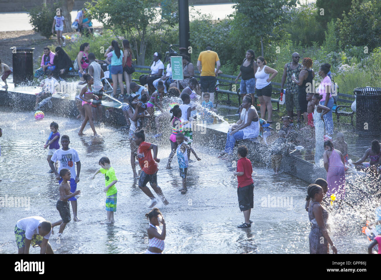 Children and adults alike cool off during the summer heat wave 2016 at ...