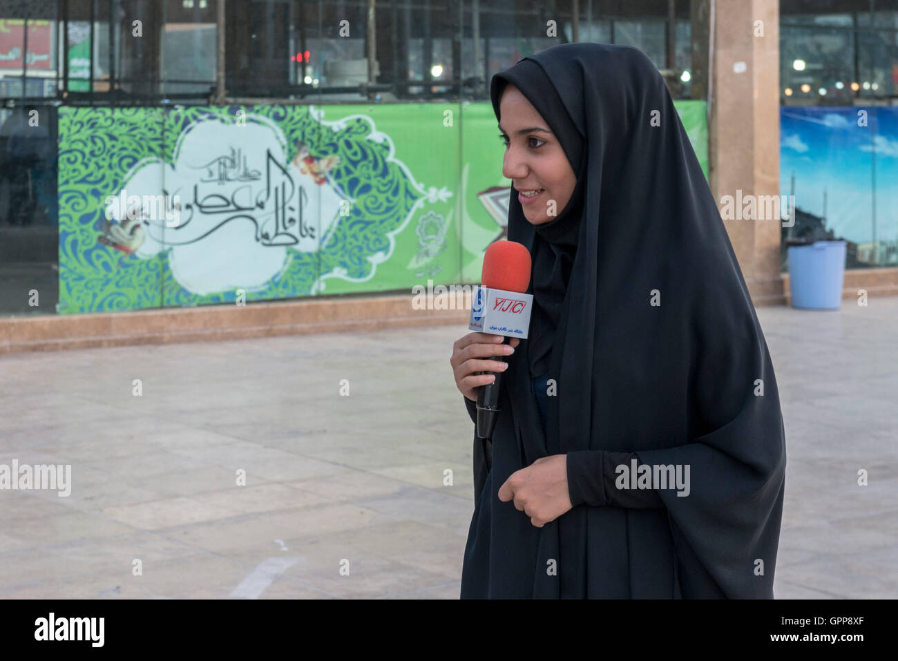Qom, Female TV Reporter Stock Photo - Alamy
