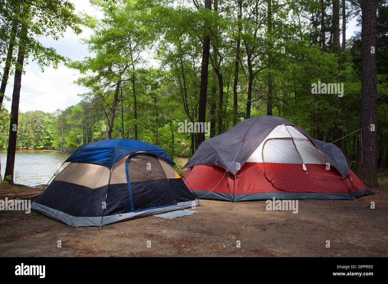 Two tents in a lakeside campsite as sunset approaches Stock Photo - Alamy