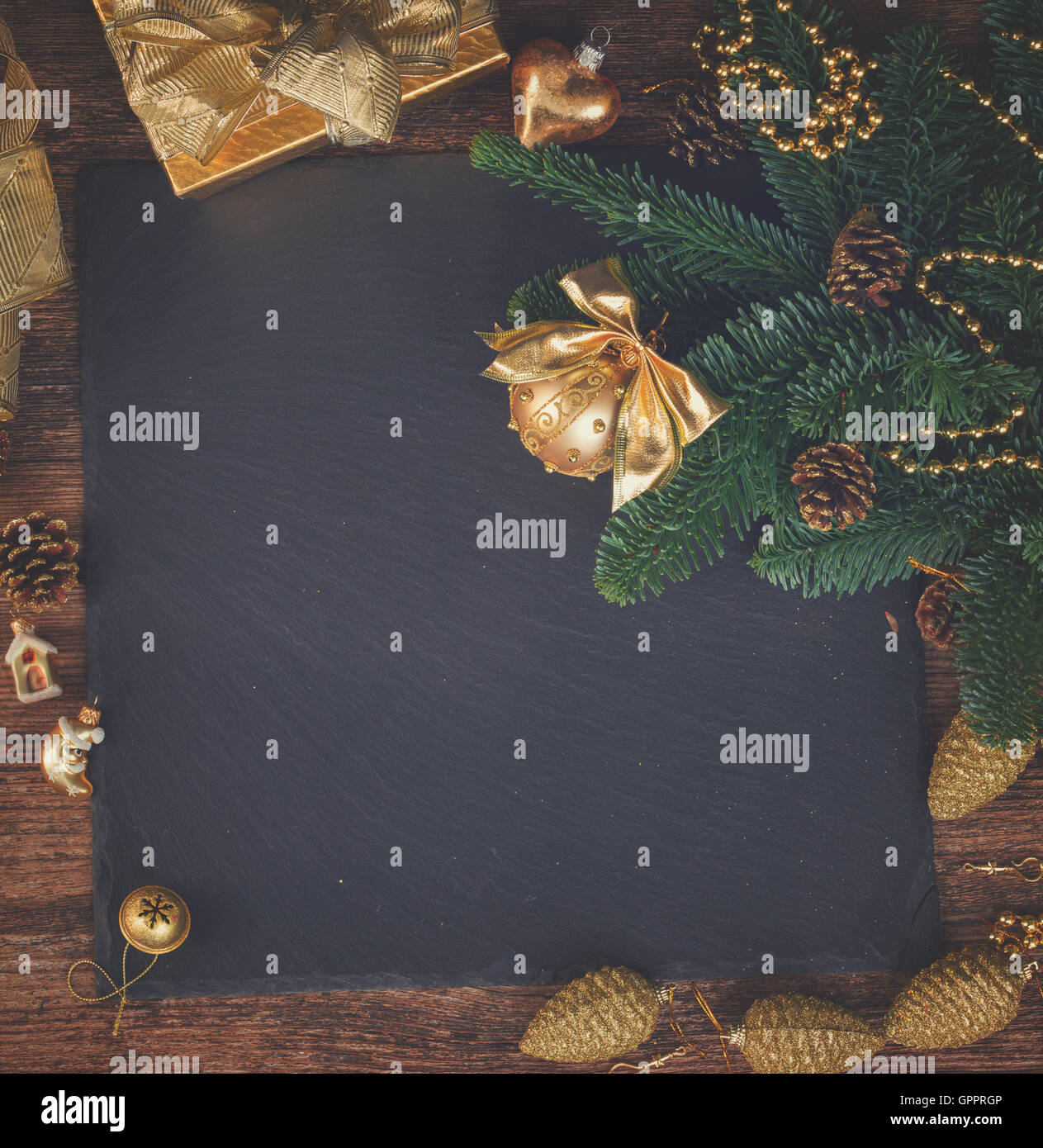 evergreen tree with golden ball Stock Photo - Alamy