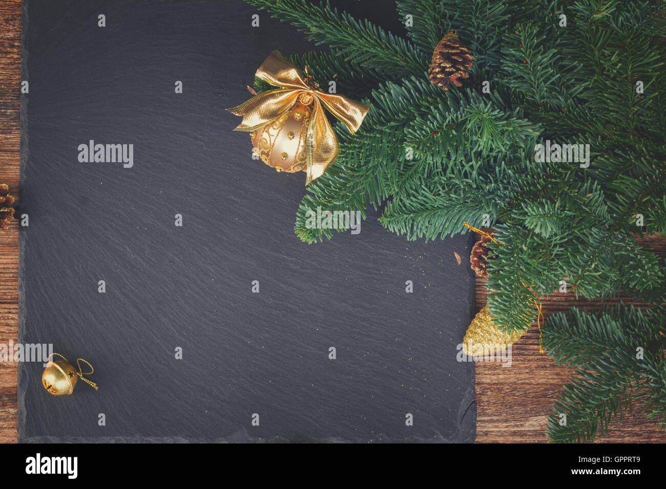 evergreen tree with golden ball Stock Photo - Alamy