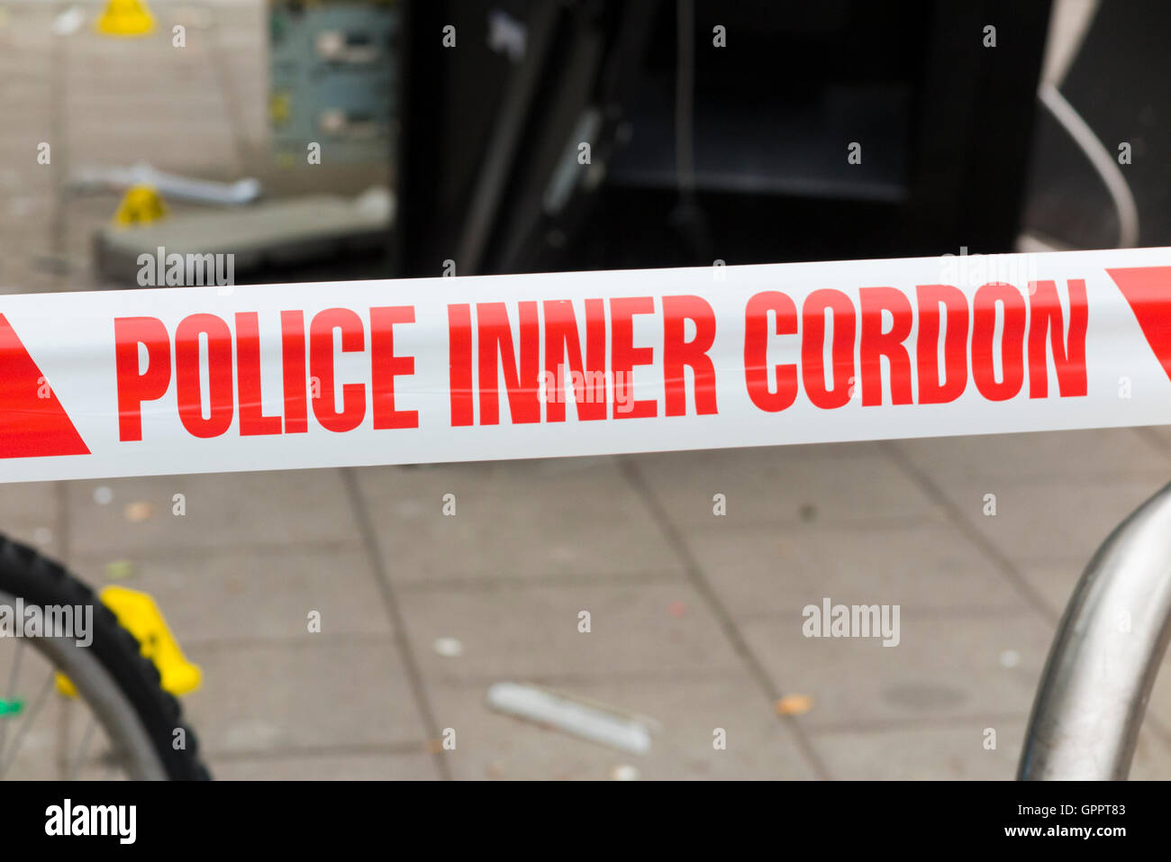 Police inner cordon tape barrier & evidence identification number ...