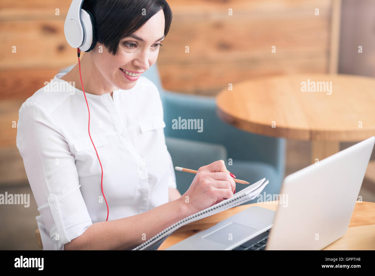 Beautiful young woman studying Stock Photo - Alamy