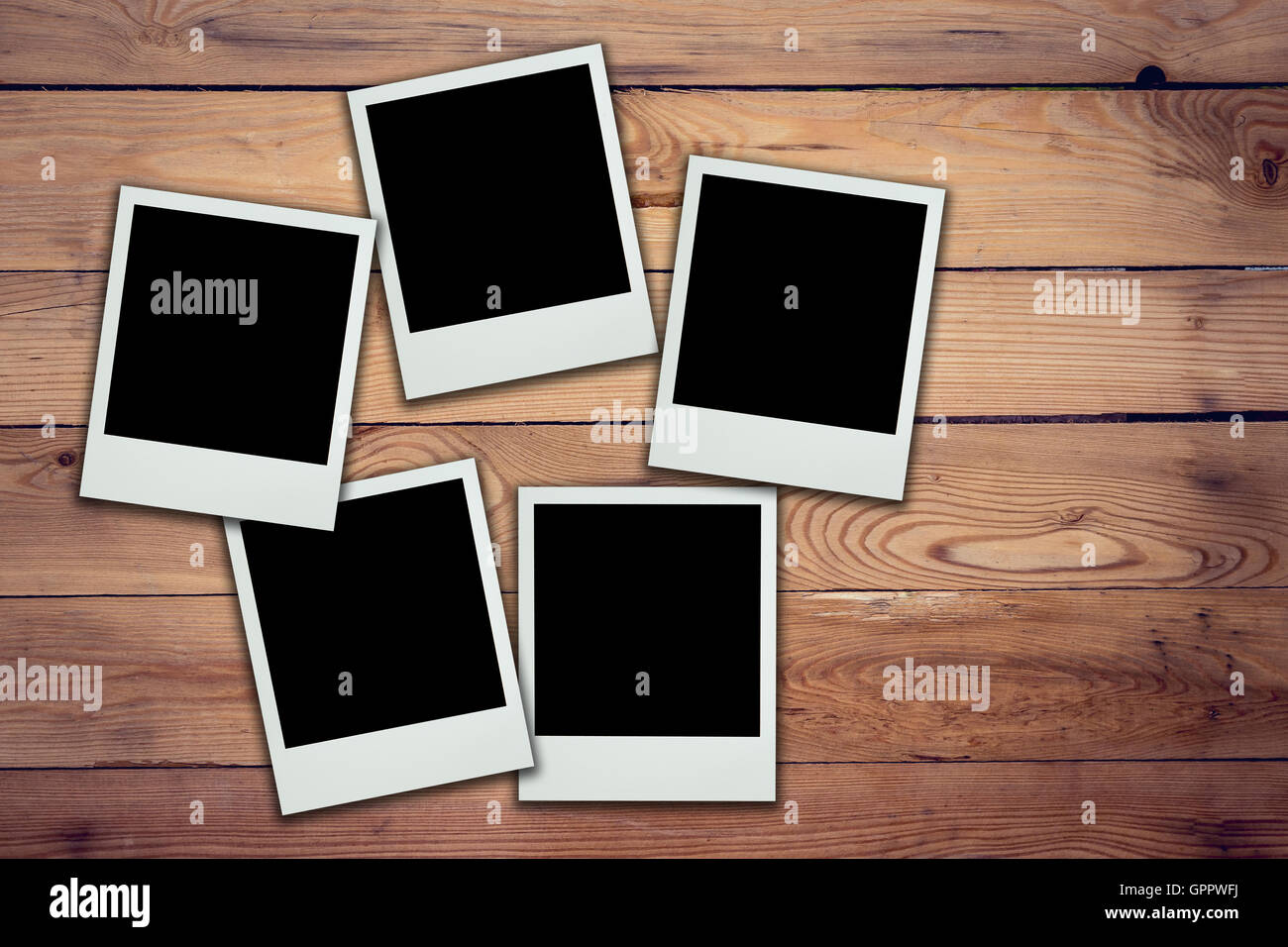 Blank photo frame on wood background and texture Stock Photo - Alamy