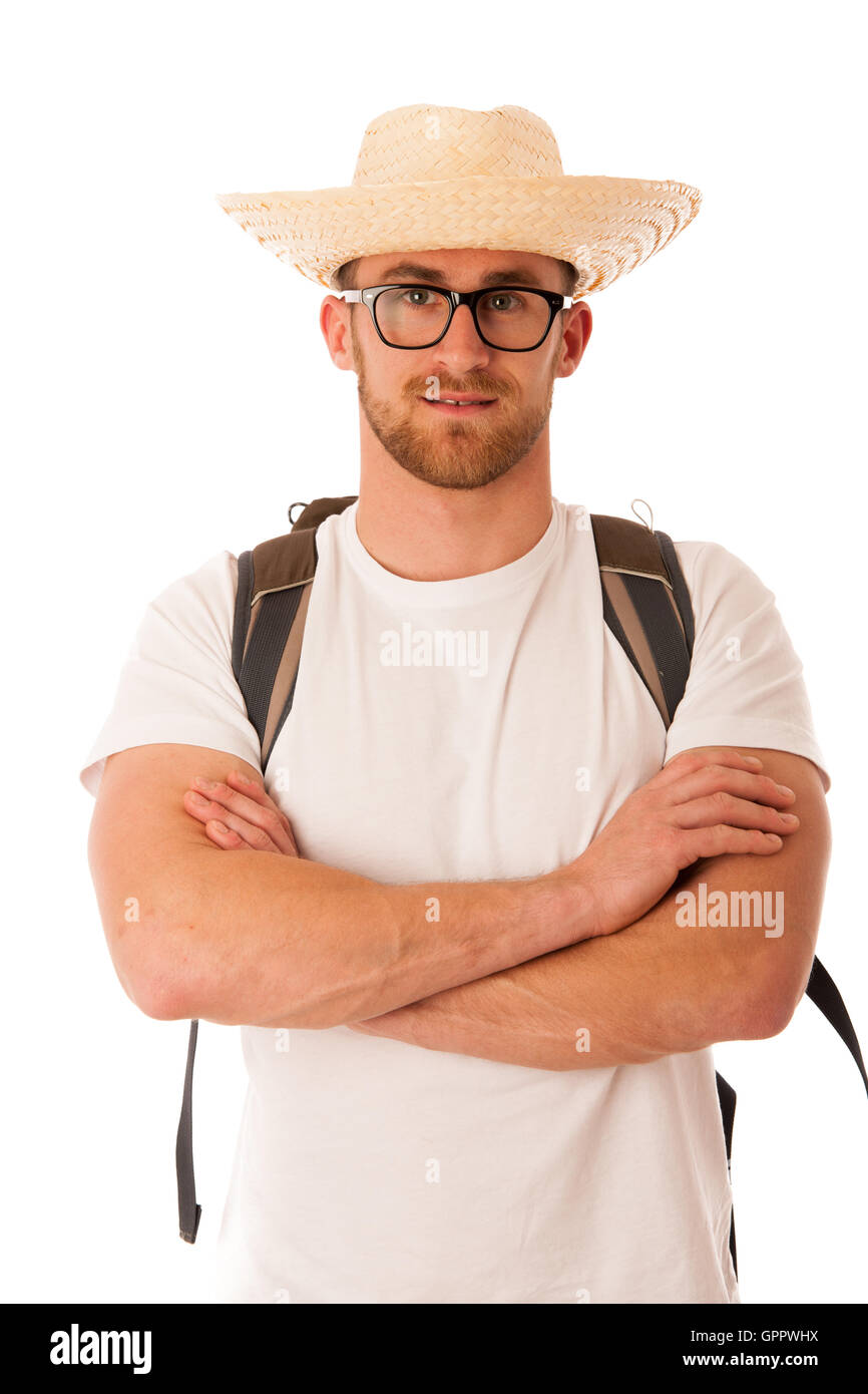 Traveler with straw hat, white shirt and backpack standing isolated ...