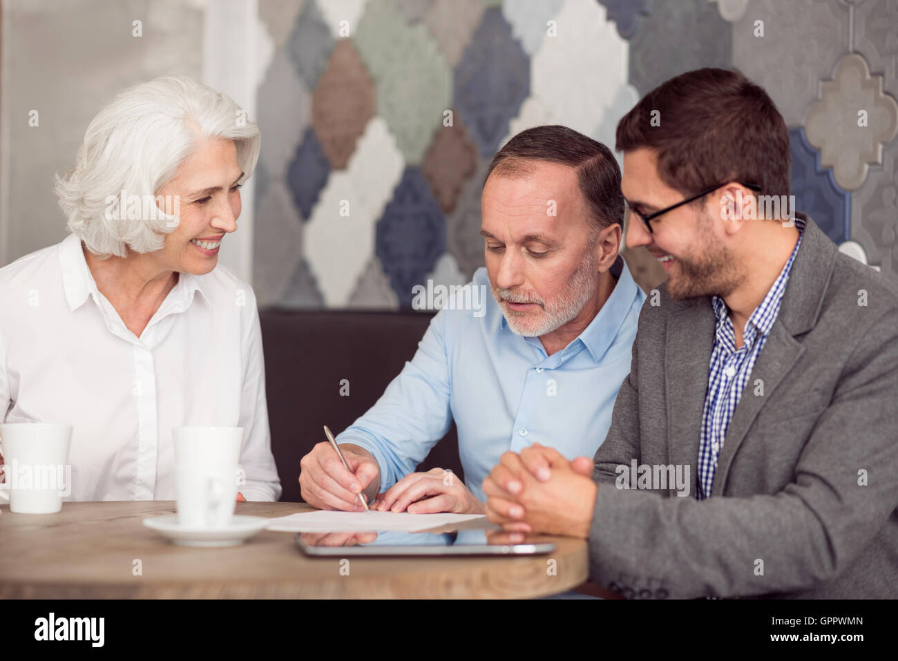 Man Signing Papers High Resolution Stock Photography and Images - Alamy