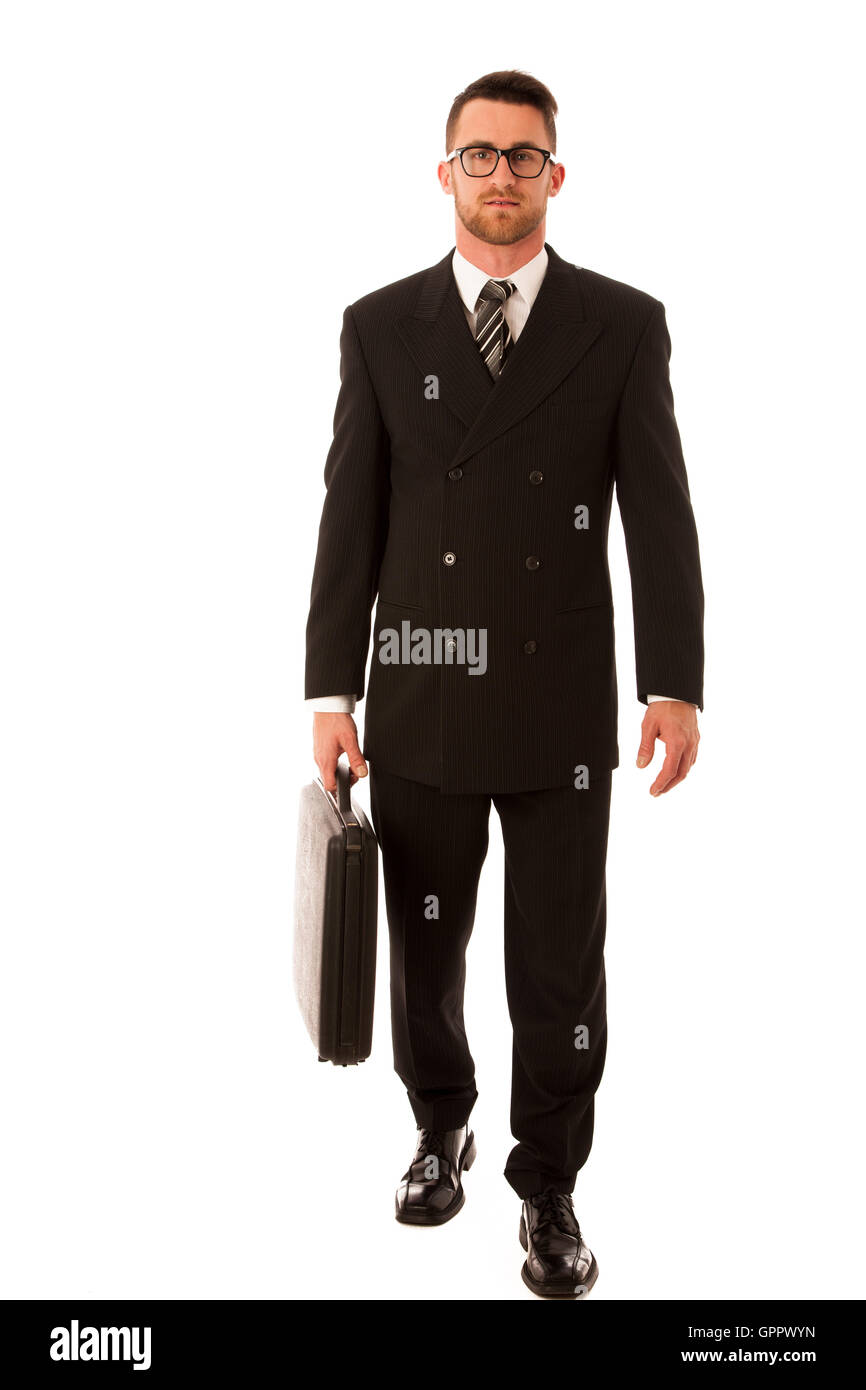 Successful businessman in formal suit and briefcase, suitcase ...
