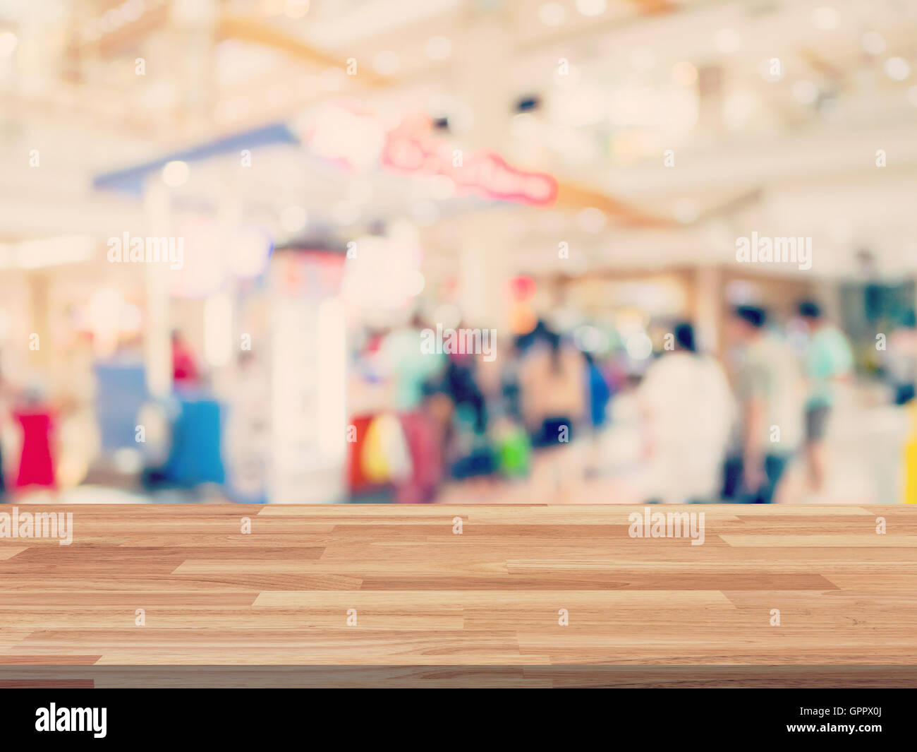 Empty wood table and Blurred background display at shopping mall with ...