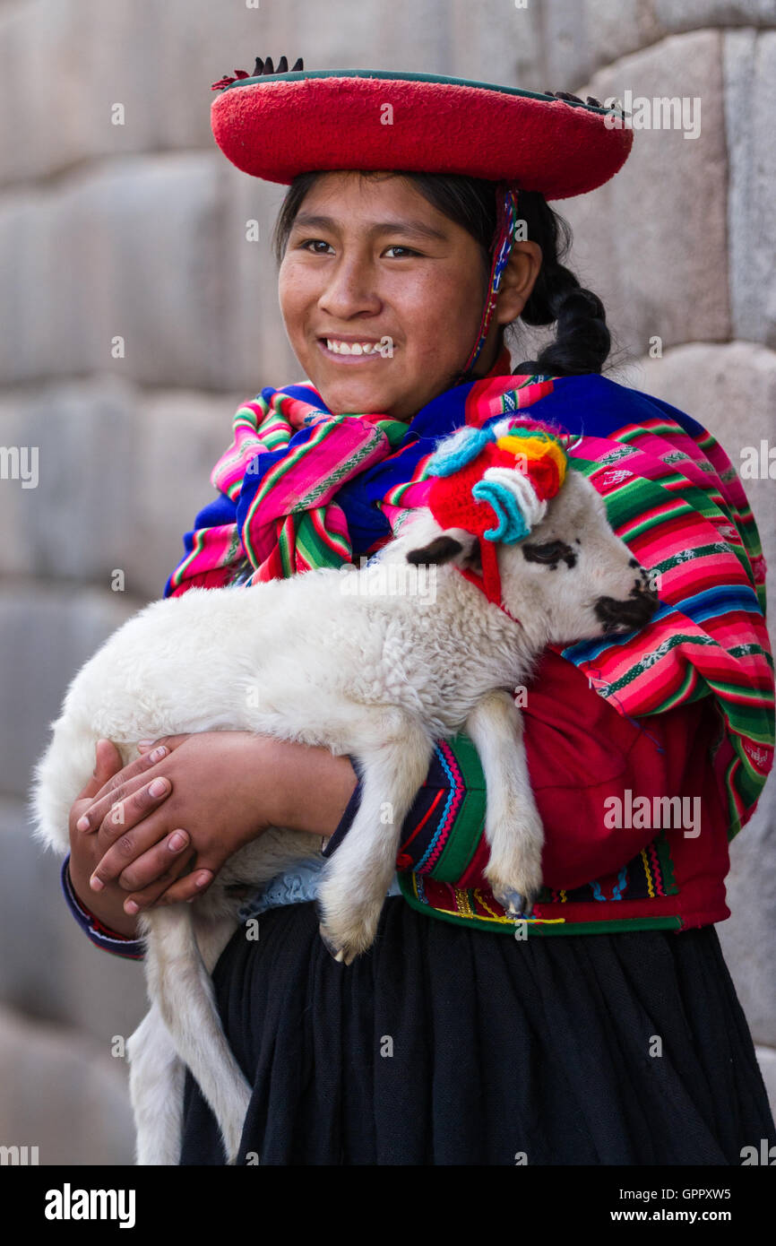 Cusco, Peru - May 14 : Jenni, a young woman dressed in colorful ...