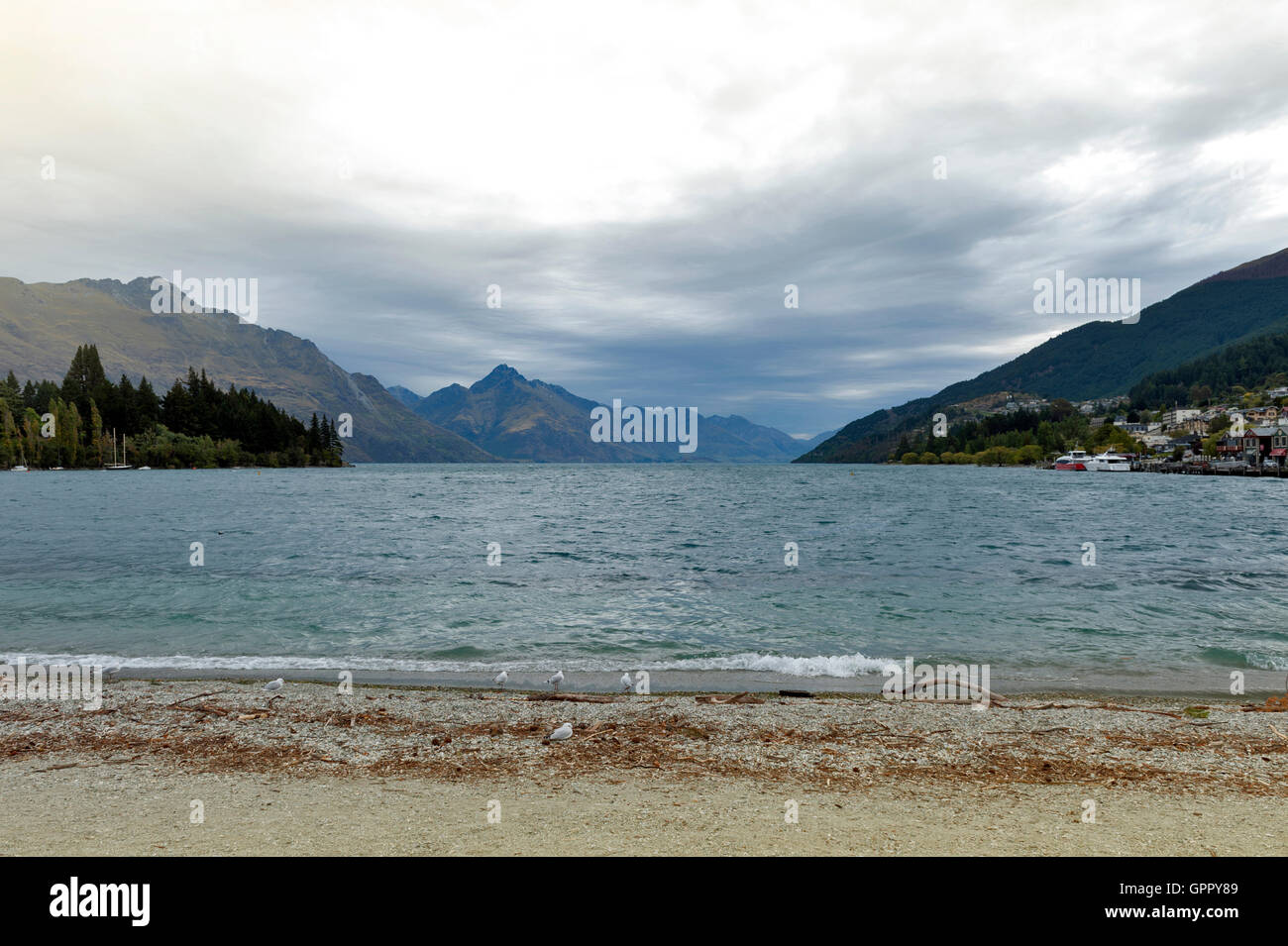 Queenstown, New Zealand - March 2016: Queenstown lakefront by Lake ...