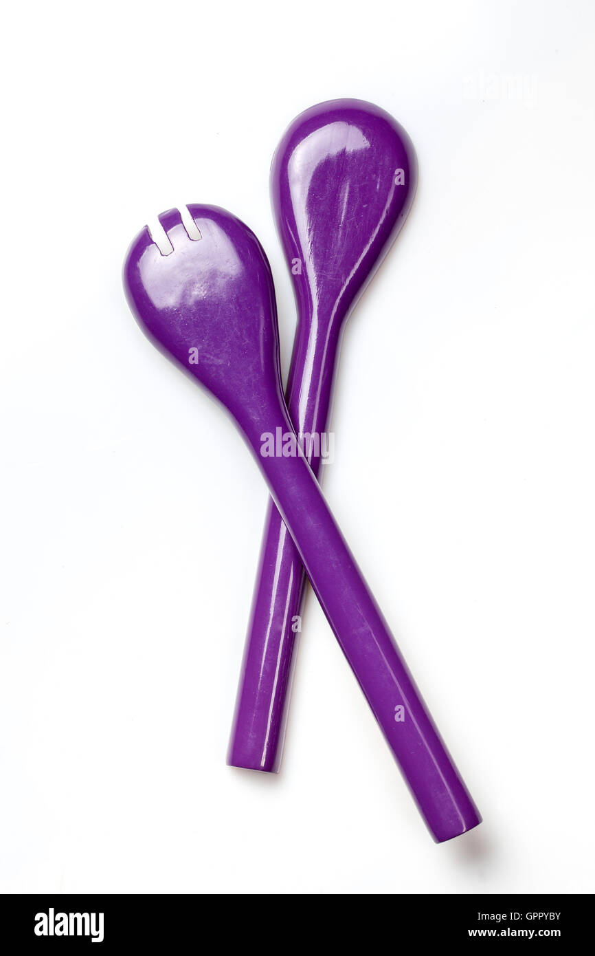 purple cooking spoons isolated on white Stock Photo - Alamy