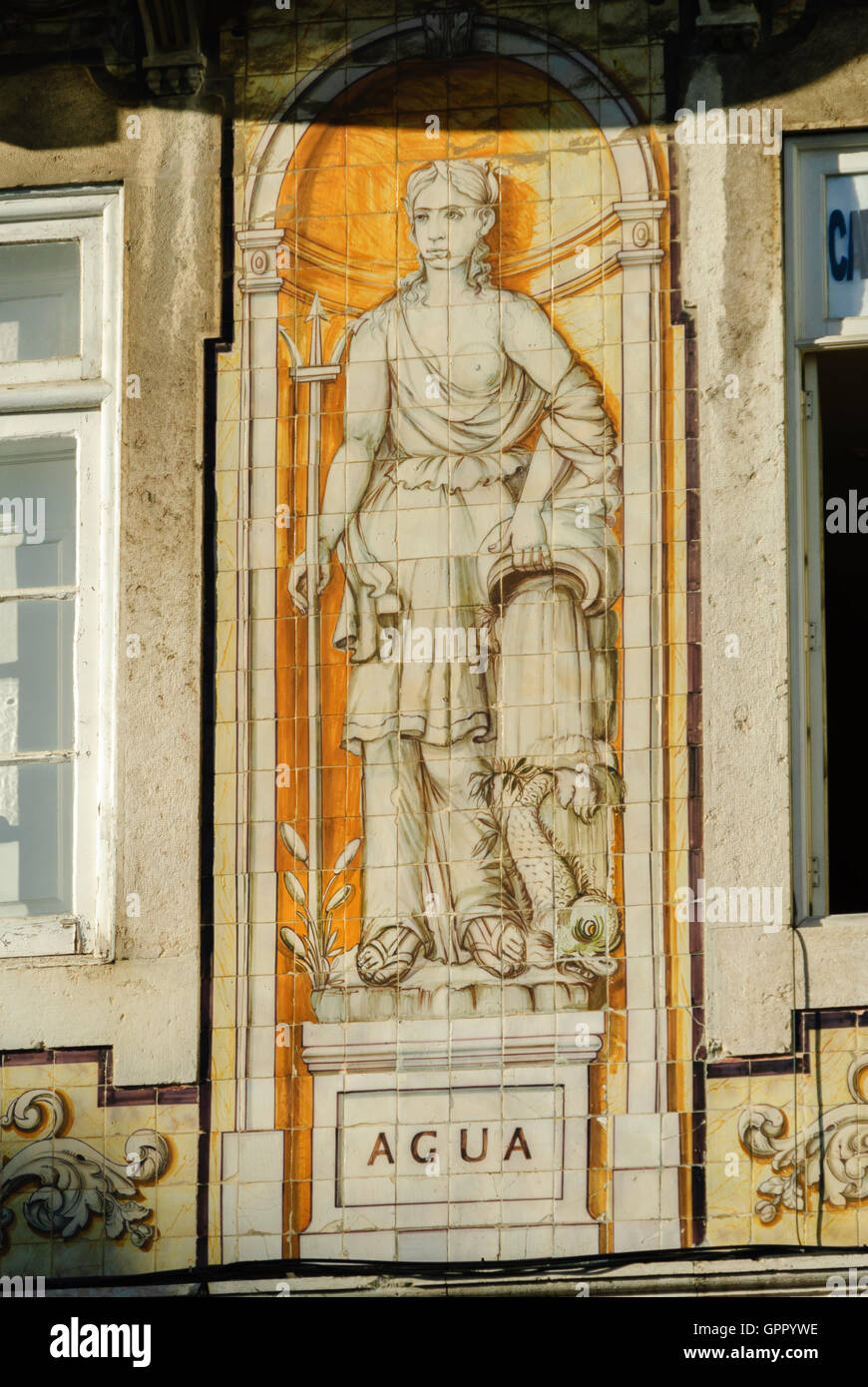 Allegorical figure on building facade Stock Photo - Alamy