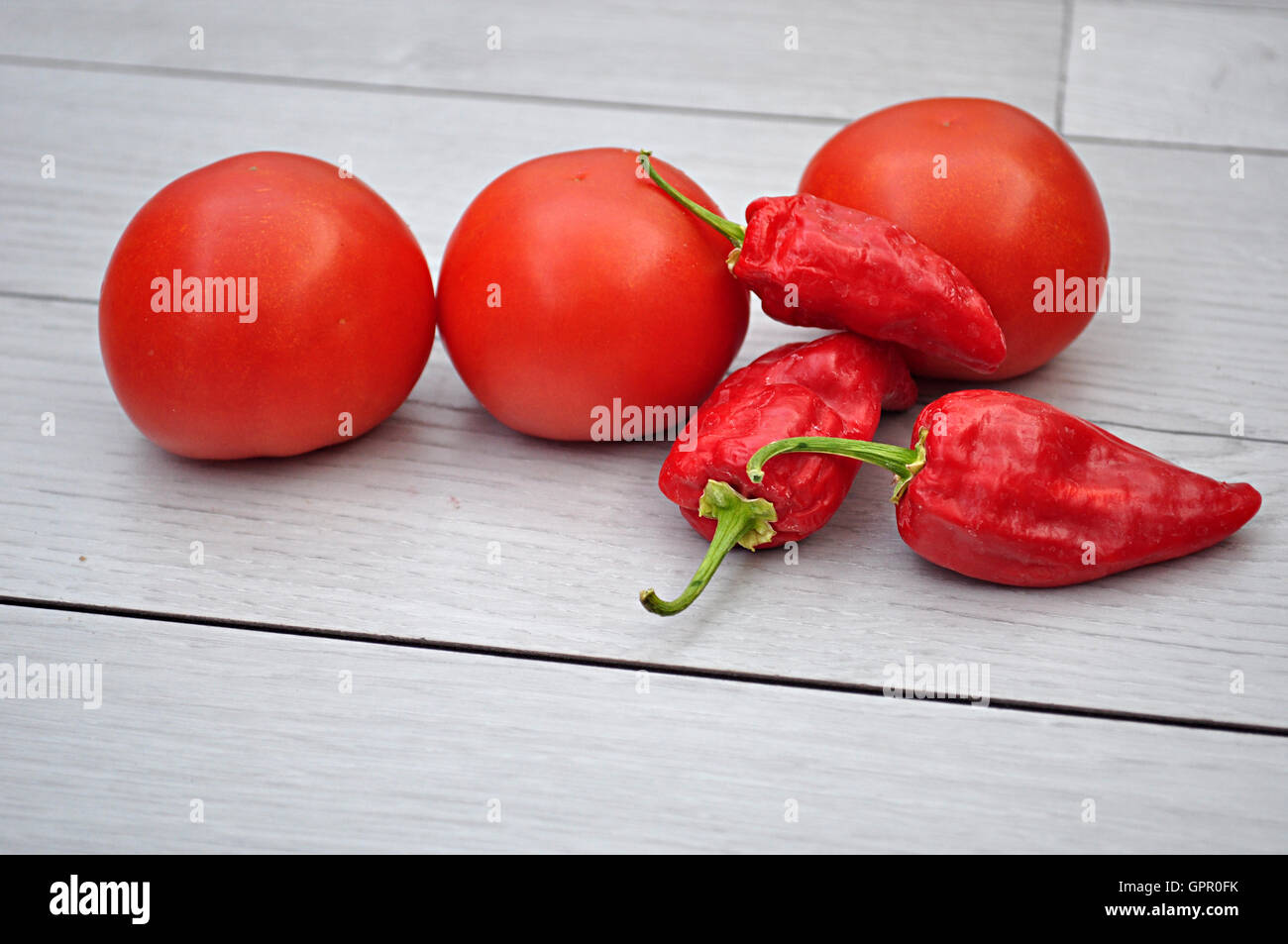 red pepper and red tomatoes Stock Photo - Alamy