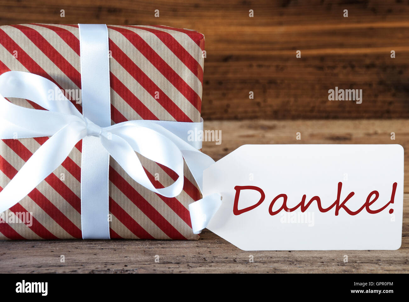 Present With Label, Danke Means Thank You Stock Photo - Alamy