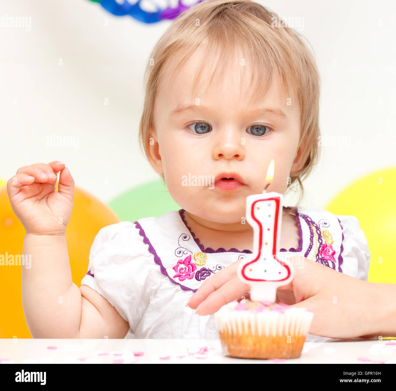 Little girl celebrating first birthday Stock Photo - Alamy