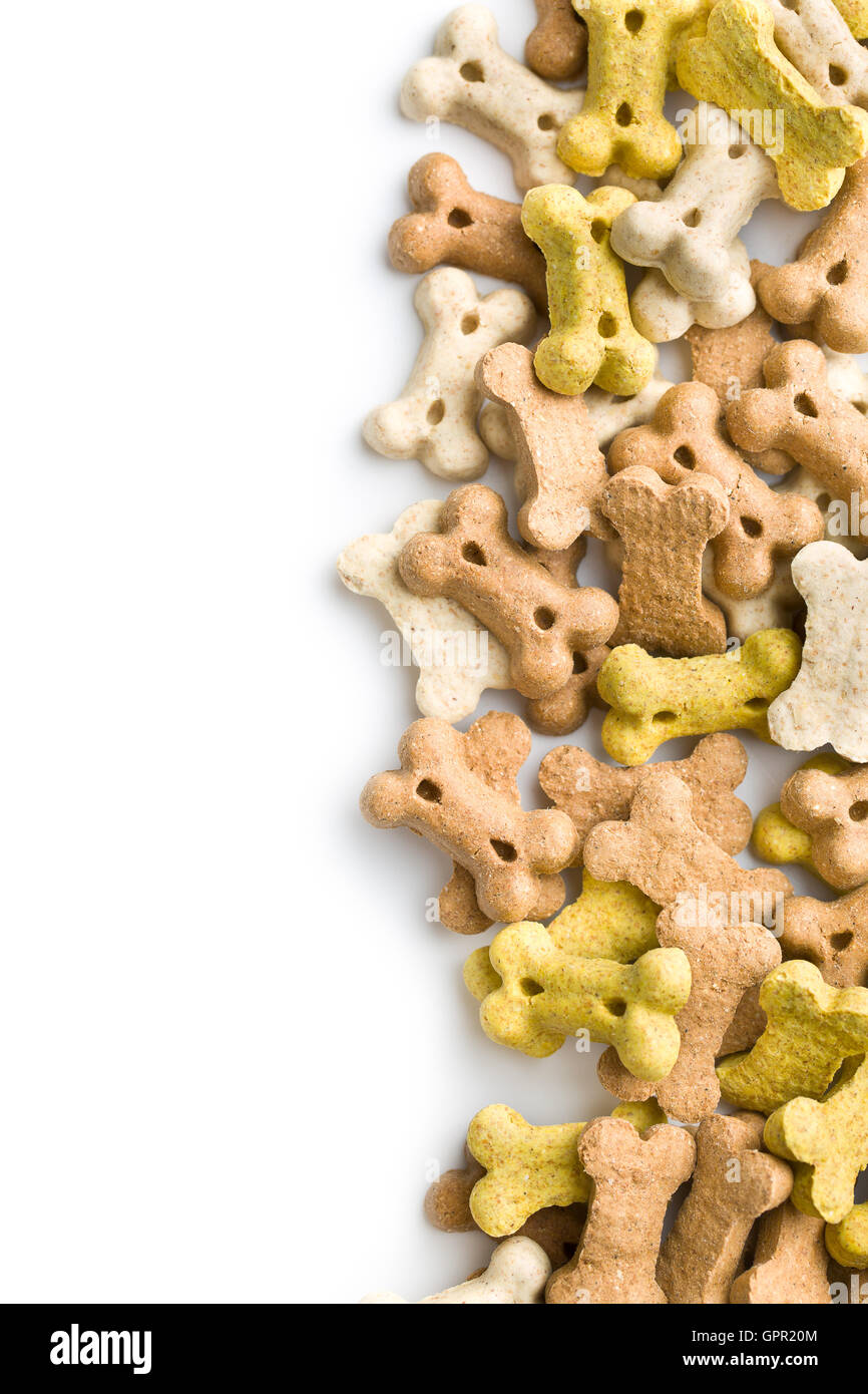 Dog food shaped like bones isolated on white background Stock Photo - Alamy
