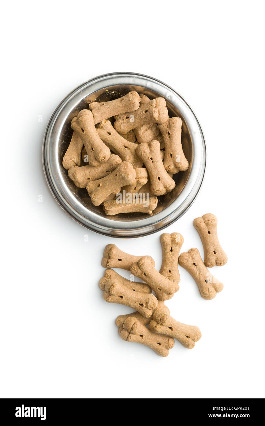 Dog food shaped like bones in bowl isolated on white background. Top ...