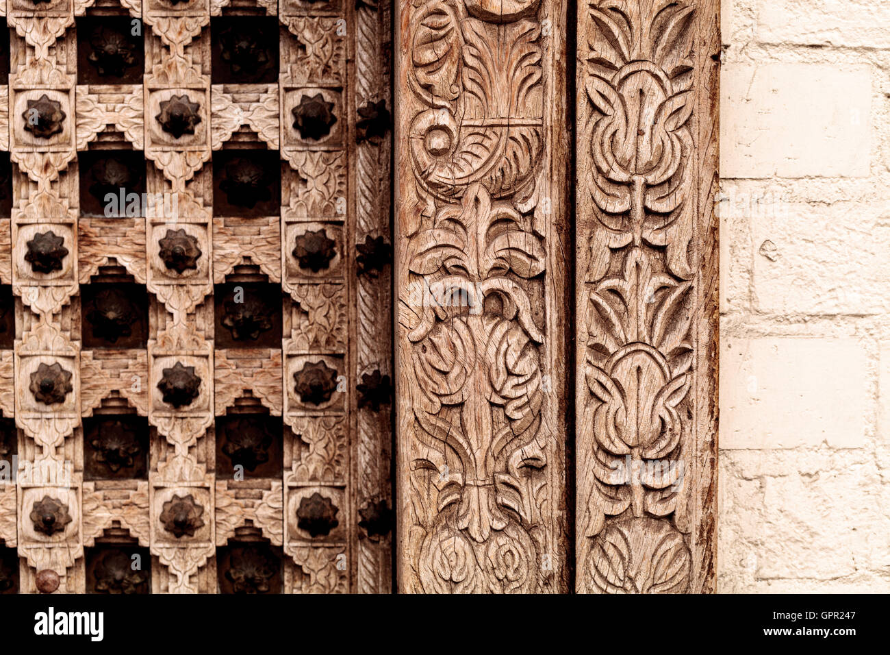 Moroccan antique wood texture door background with iron rings and bolts ...