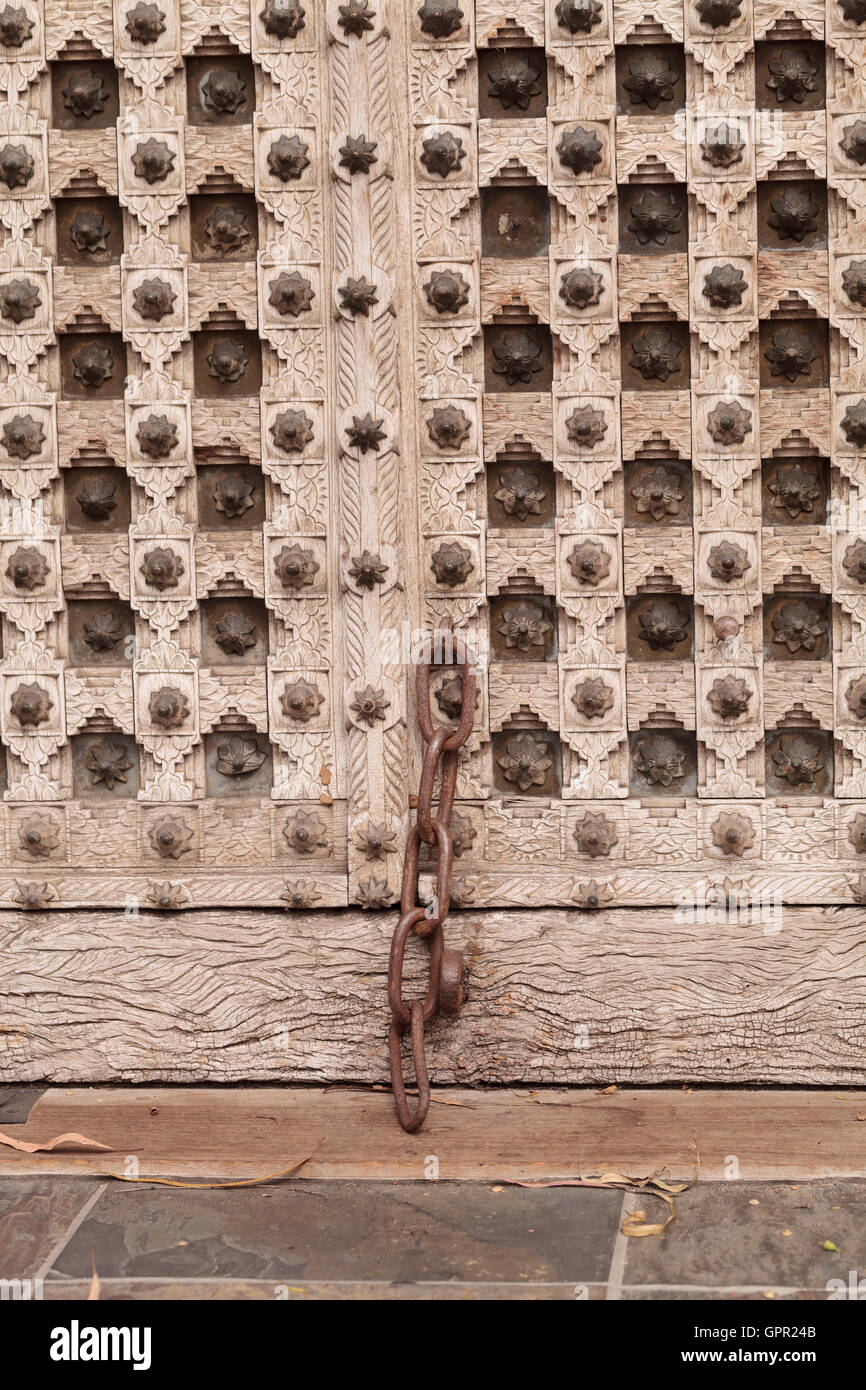 Moroccan antique wood texture door background with iron rings and bolts ...