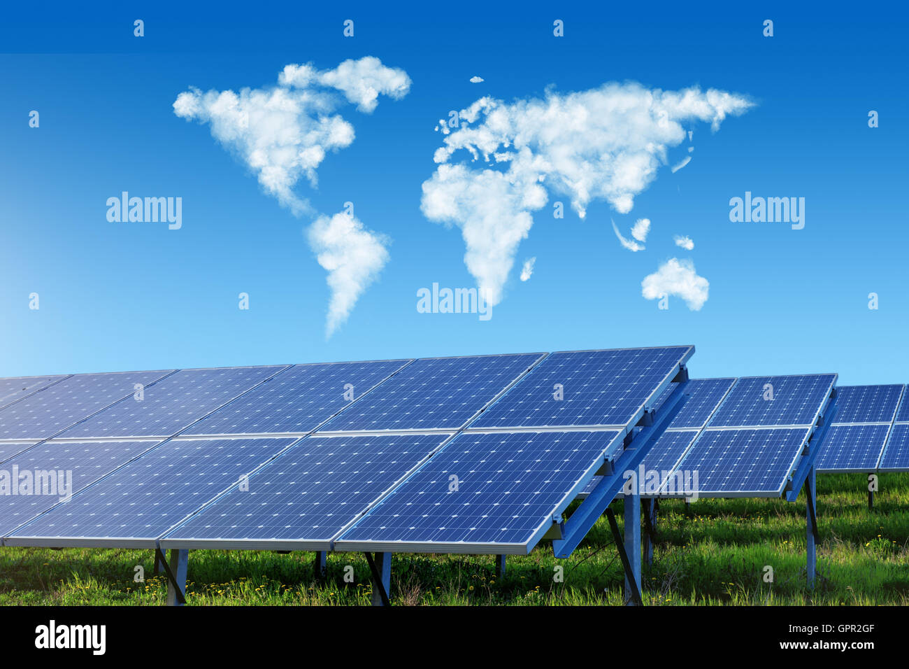 solar panels with world map in sky Stock Photo - Alamy