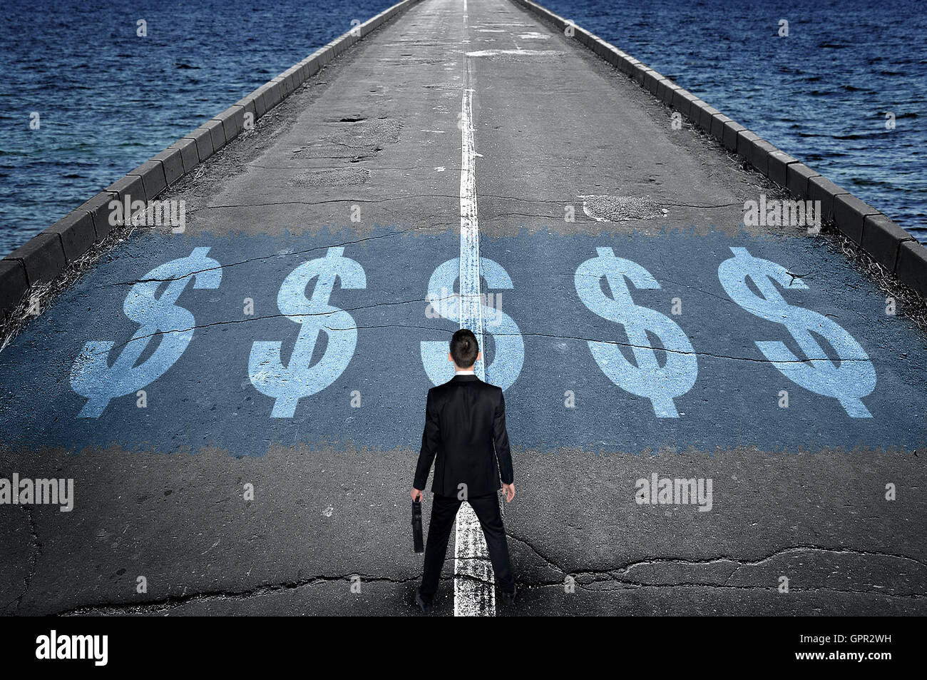 Dollar sign on road and business man Stock Photo - Alamy