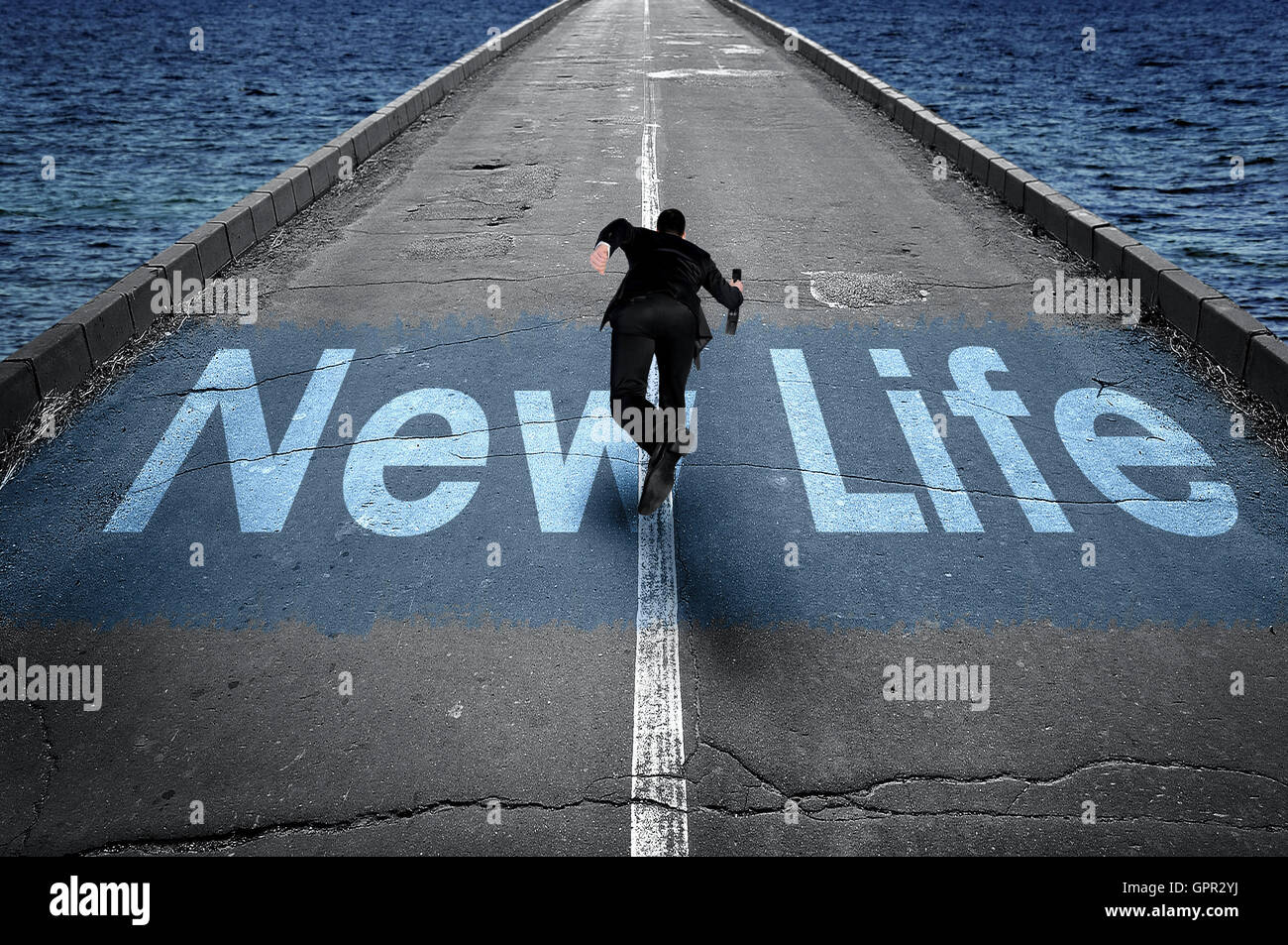 New Life message on road and business man Stock Photo - Alamy