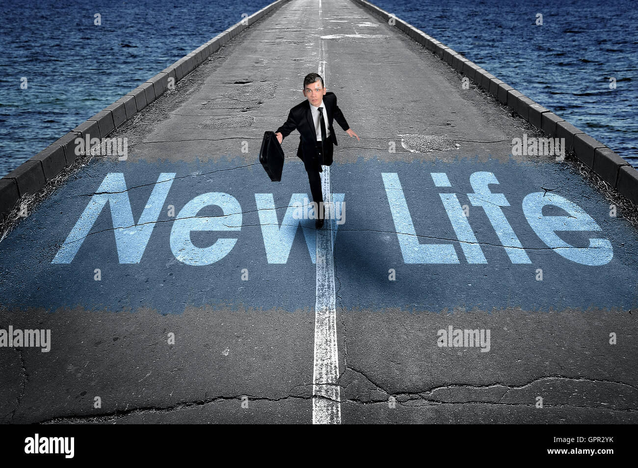 New Life message on road and business man Stock Photo - Alamy