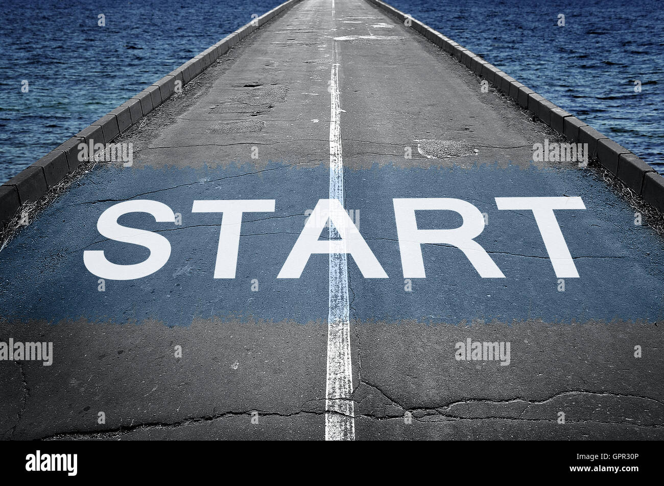 Start message on empty road Stock Photo - Alamy