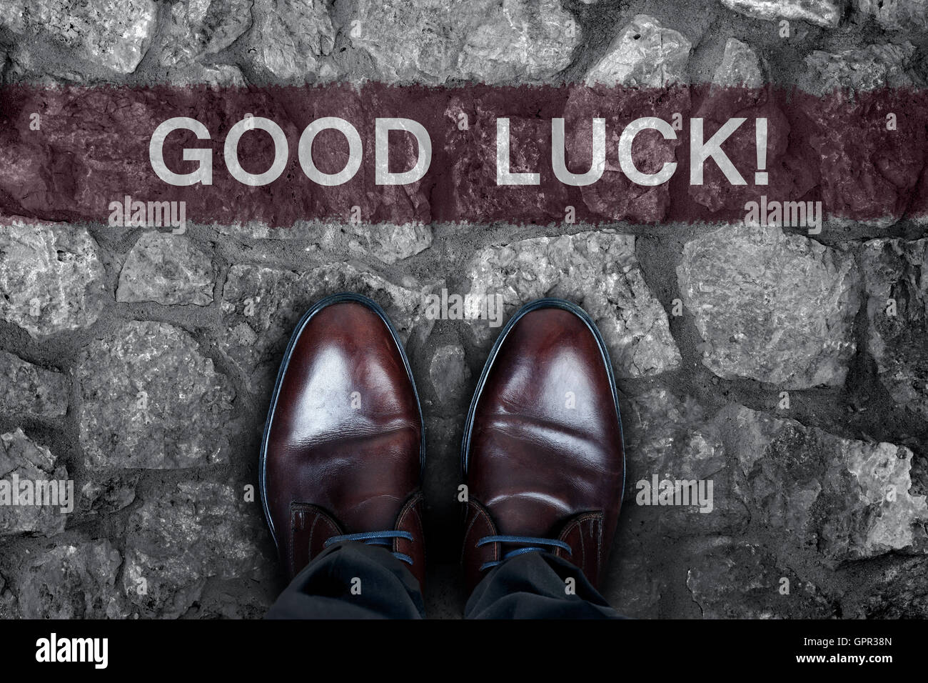 Good Luck message on asphalt and business shoes Stock Photo - Alamy