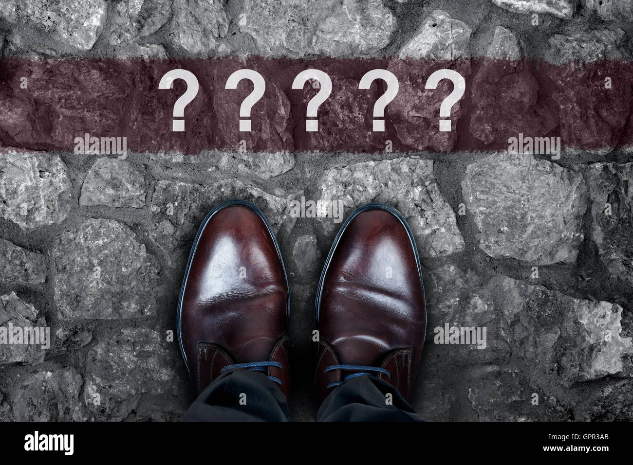 Question marks message on asphalt and business shoes Stock Photo - Alamy