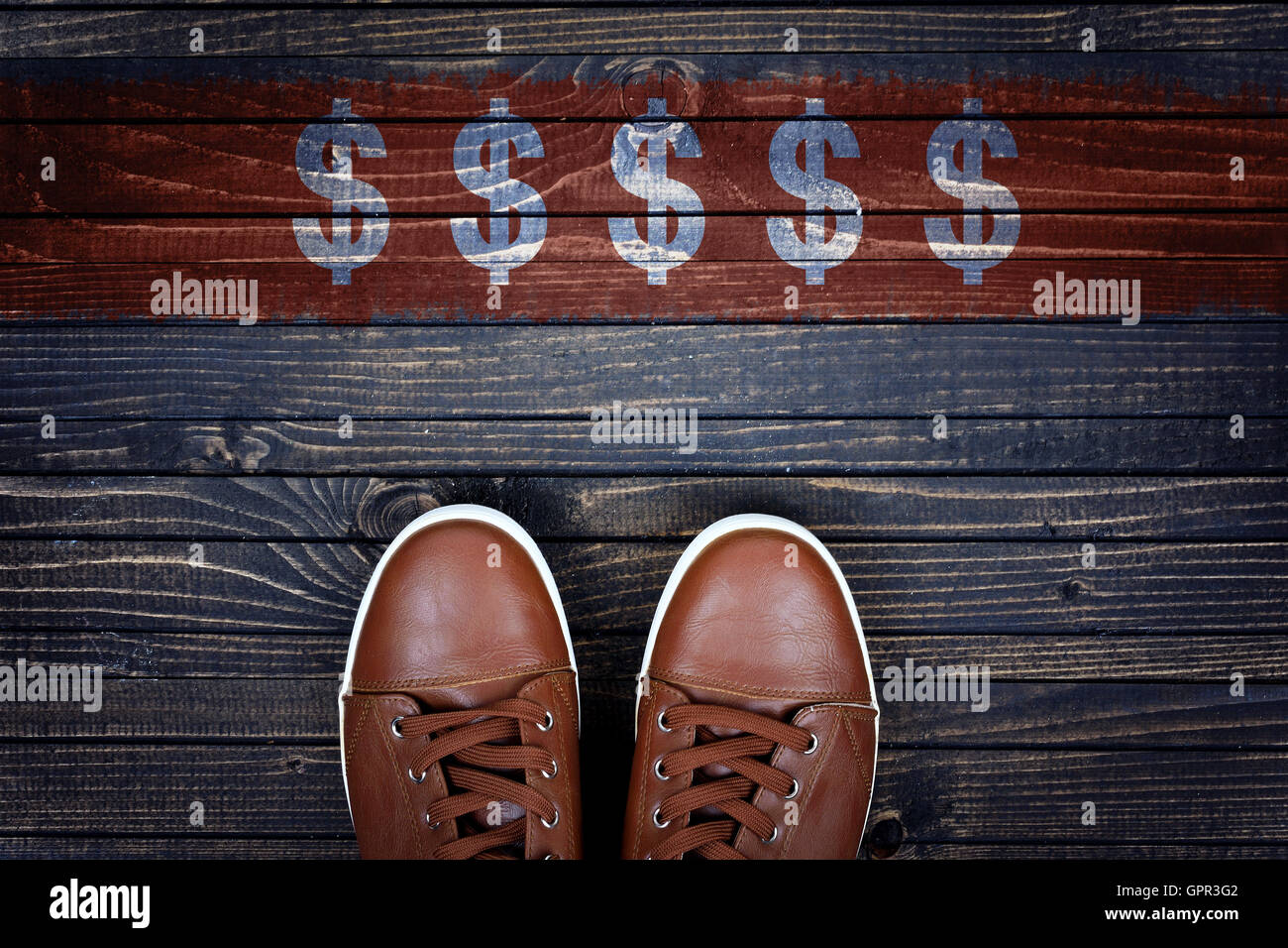 Dollar Sign message and sport shoes on wooden floor Stock Photo - Alamy