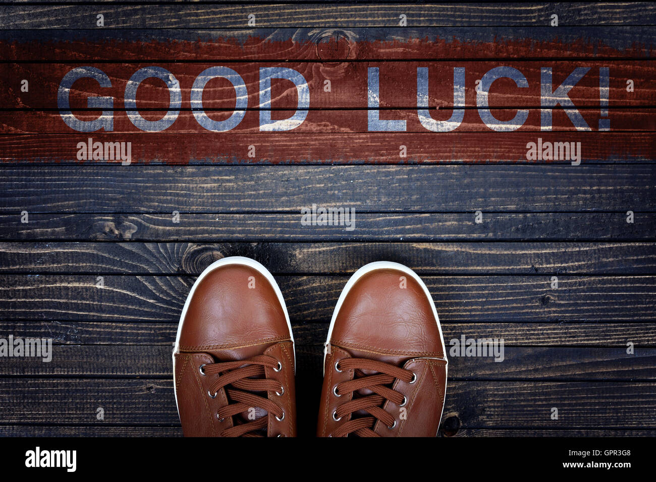 Good Luck message and sport shoes on wooden floor Stock Photo - Alamy