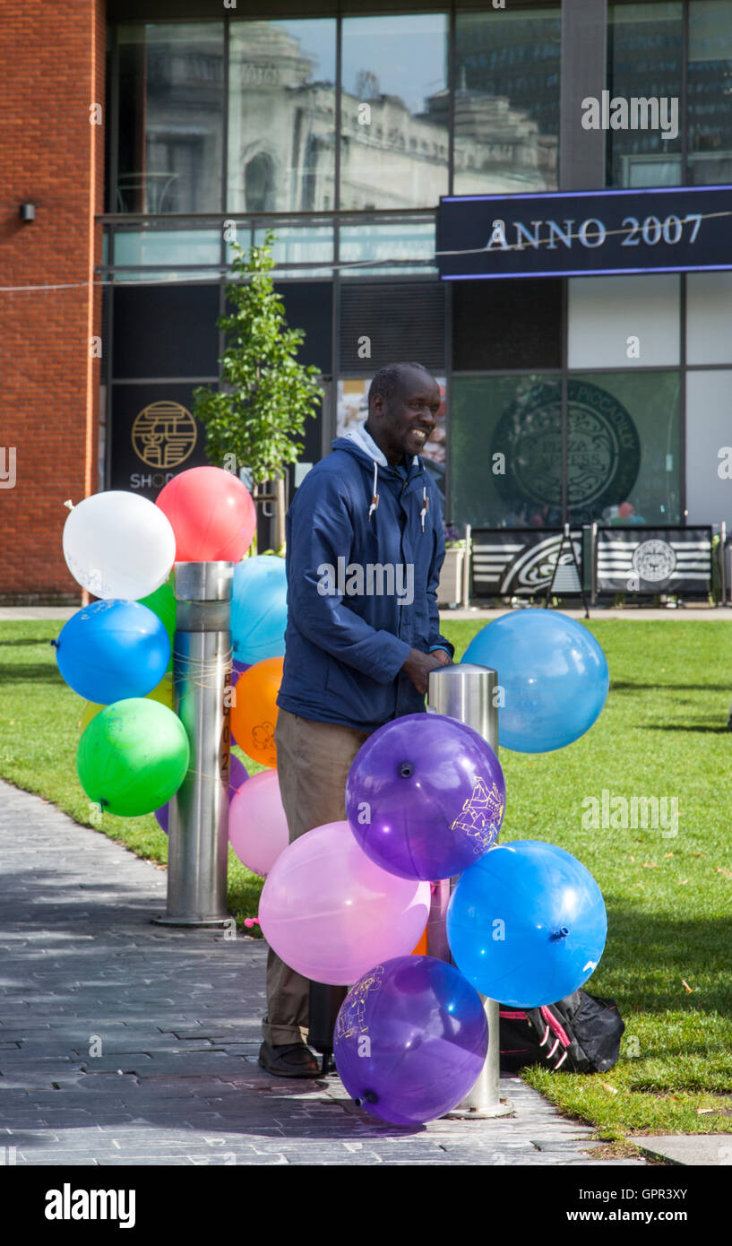 Hand held air inflated balloon hi-res stock photography and images - Alamy