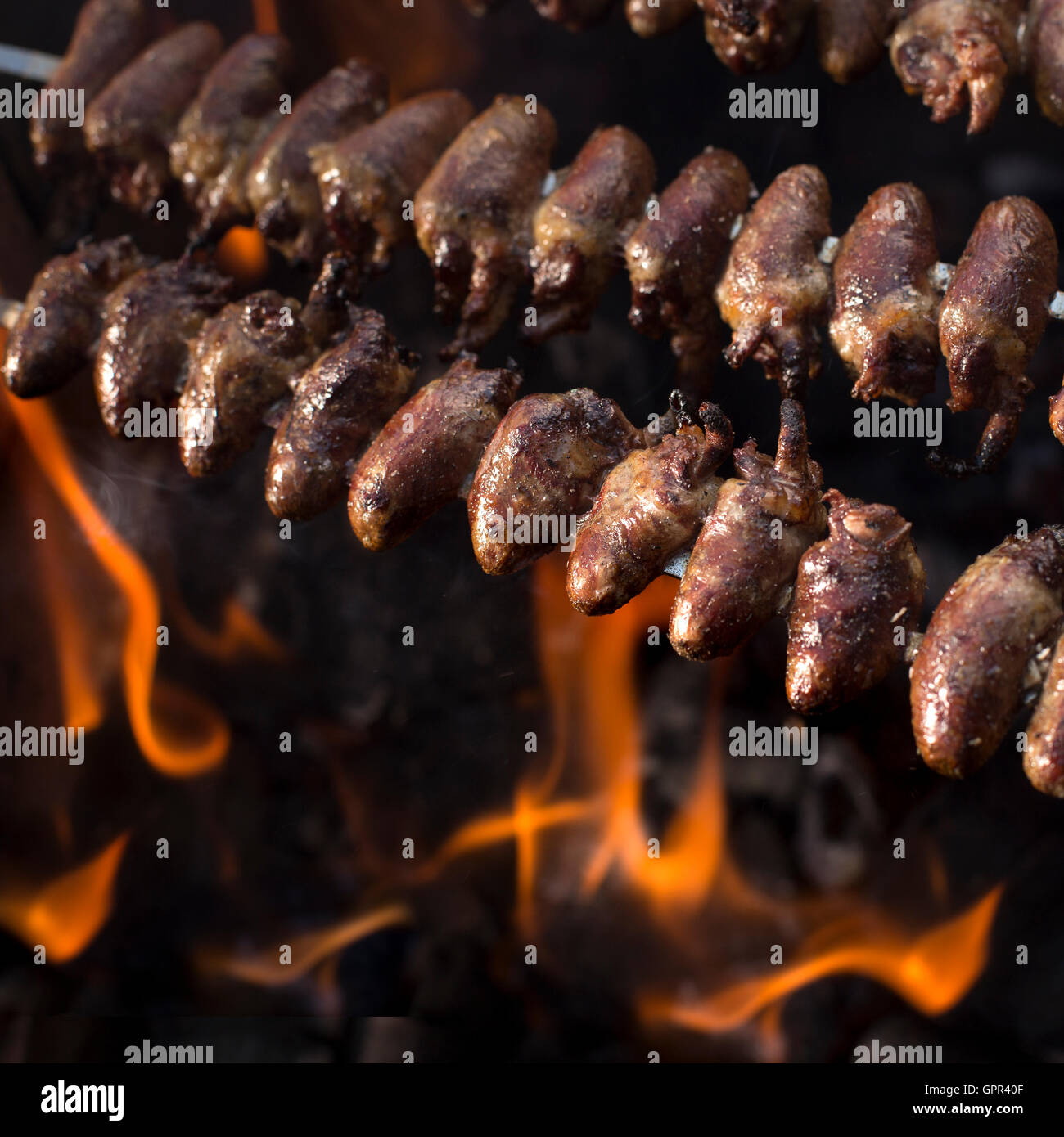 Churrasco, traditional Brazilian barbecue, chicken hearts grilled ...