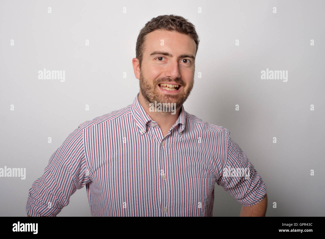 Portrait of a man on gray background Stock Photo - Alamy