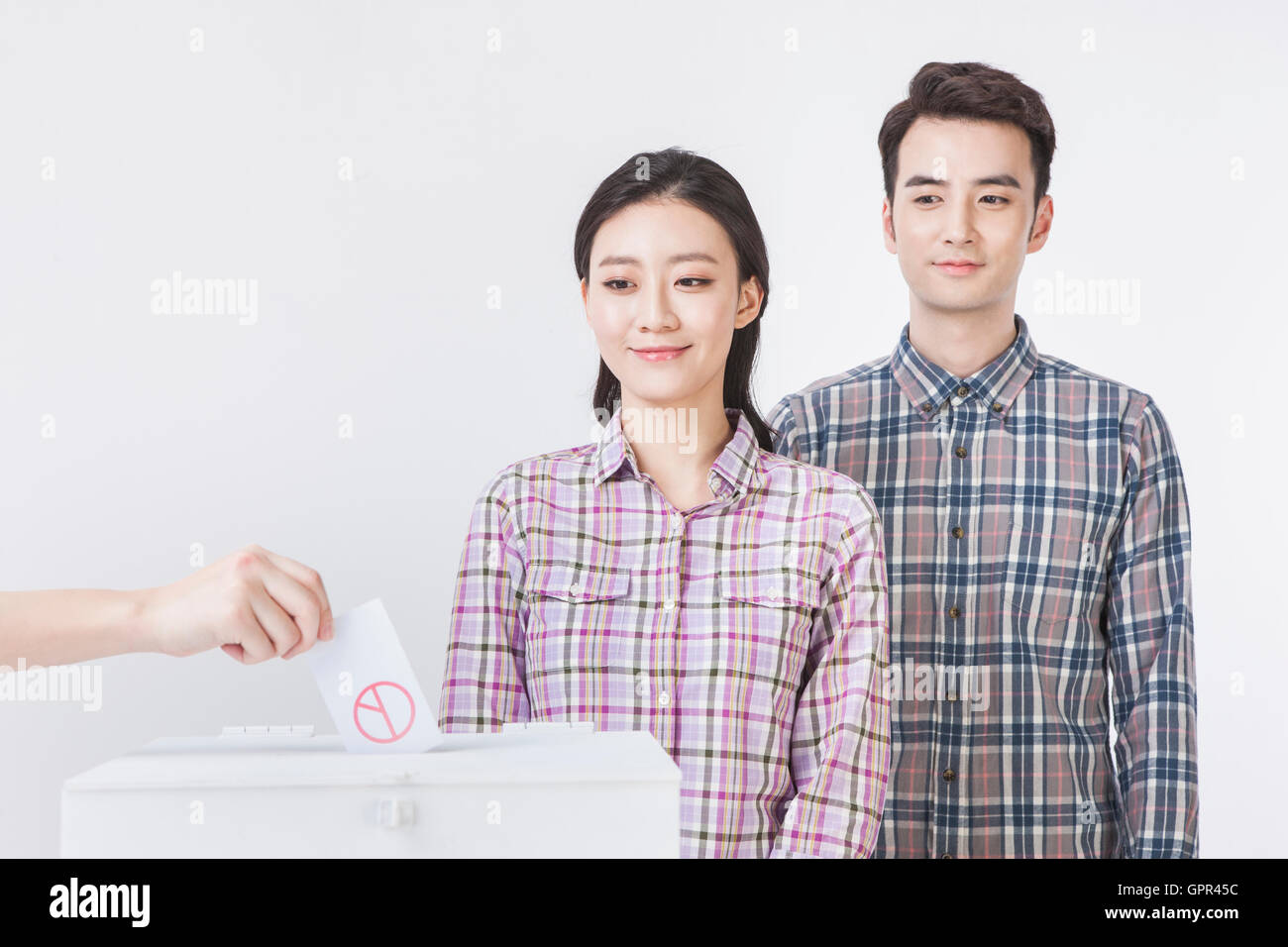Young couple voters Stock Photo - Alamy