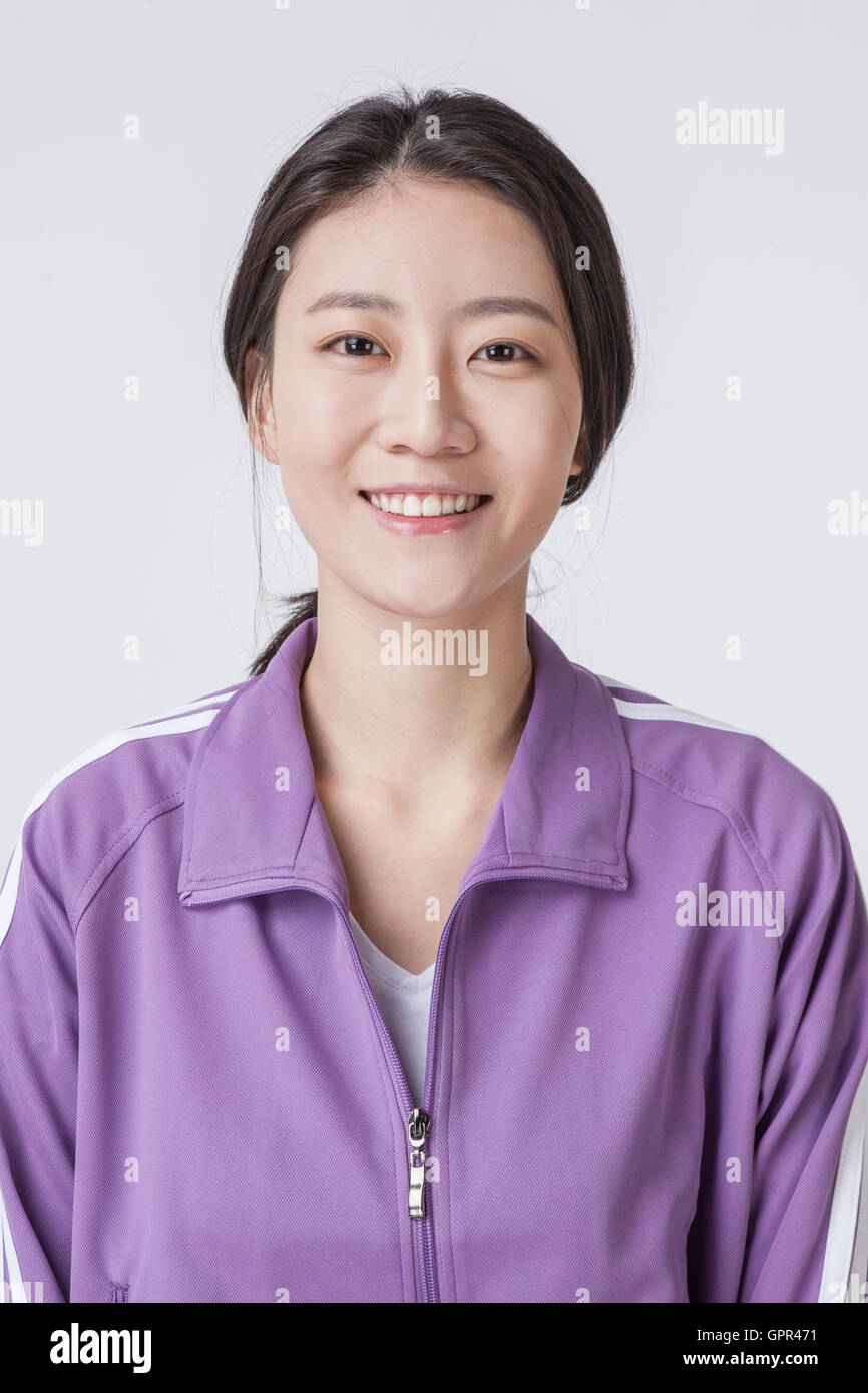 Portrait of young smiling female NEET Stock Photo - Alamy