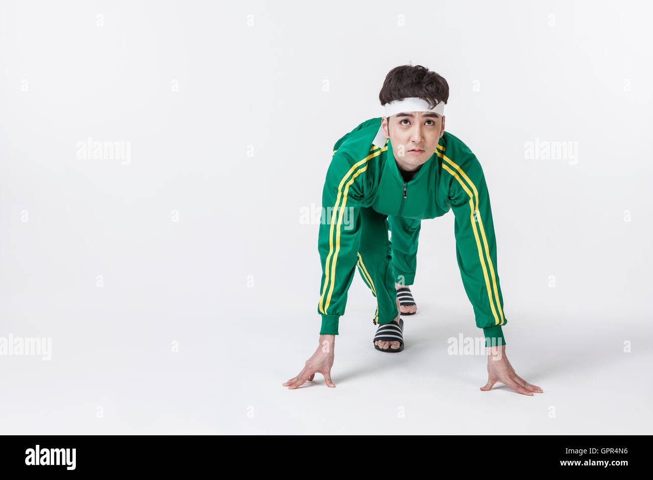 Young male job seeker ready to run Stock Photo - Alamy