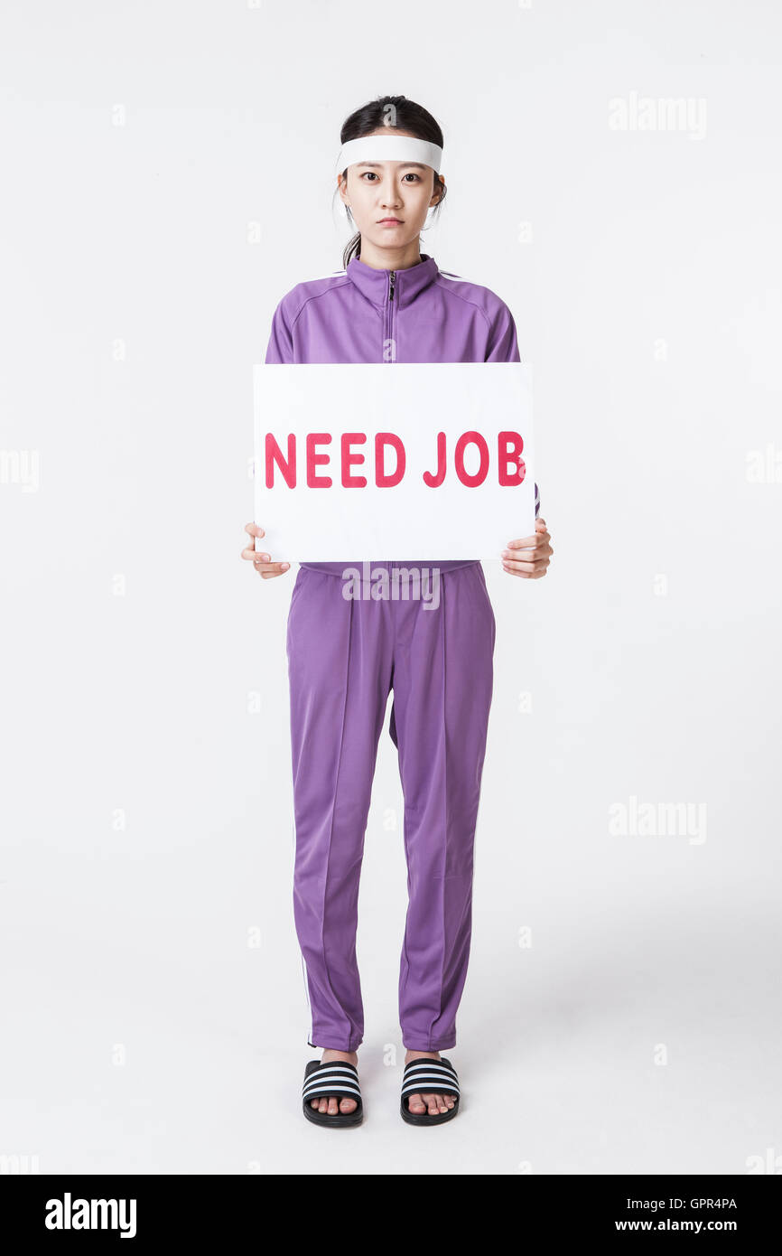Young female unemployed standing with message of NEED JOB Stock Photo ...