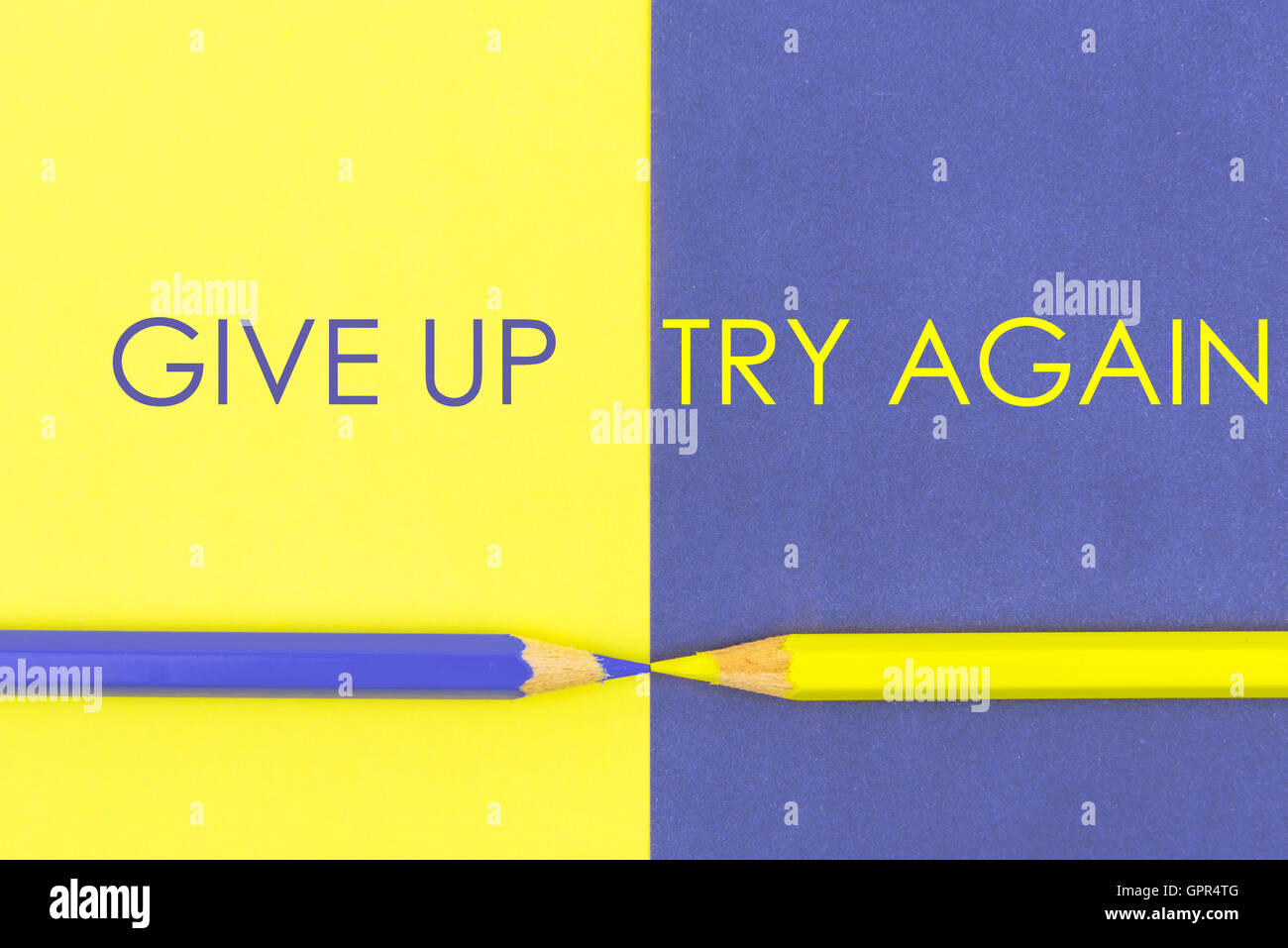 Give Up versus Try Again contrast concept . Yellow and Violet coloured ...