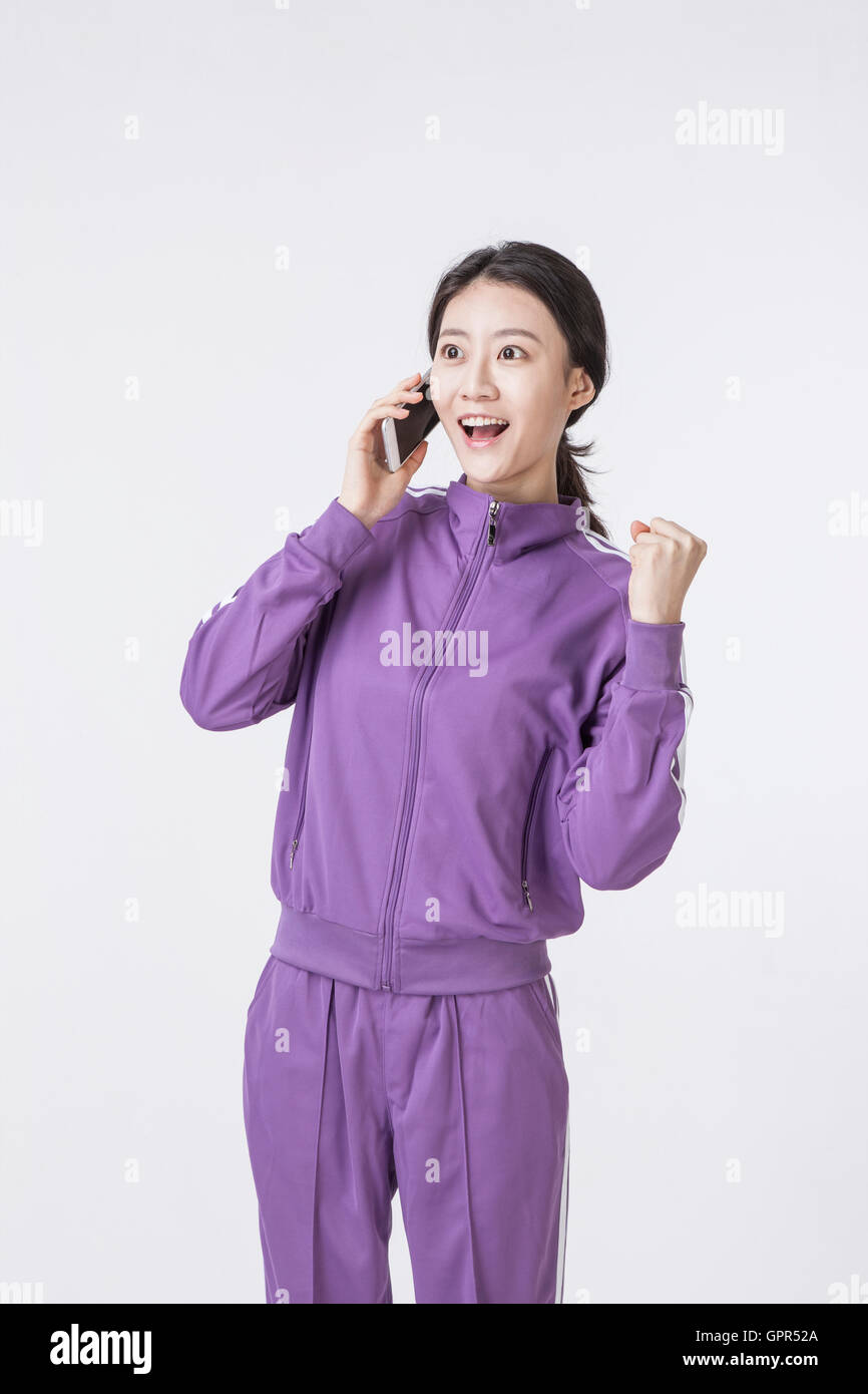 Smiling young female NEET Stock Photo - Alamy