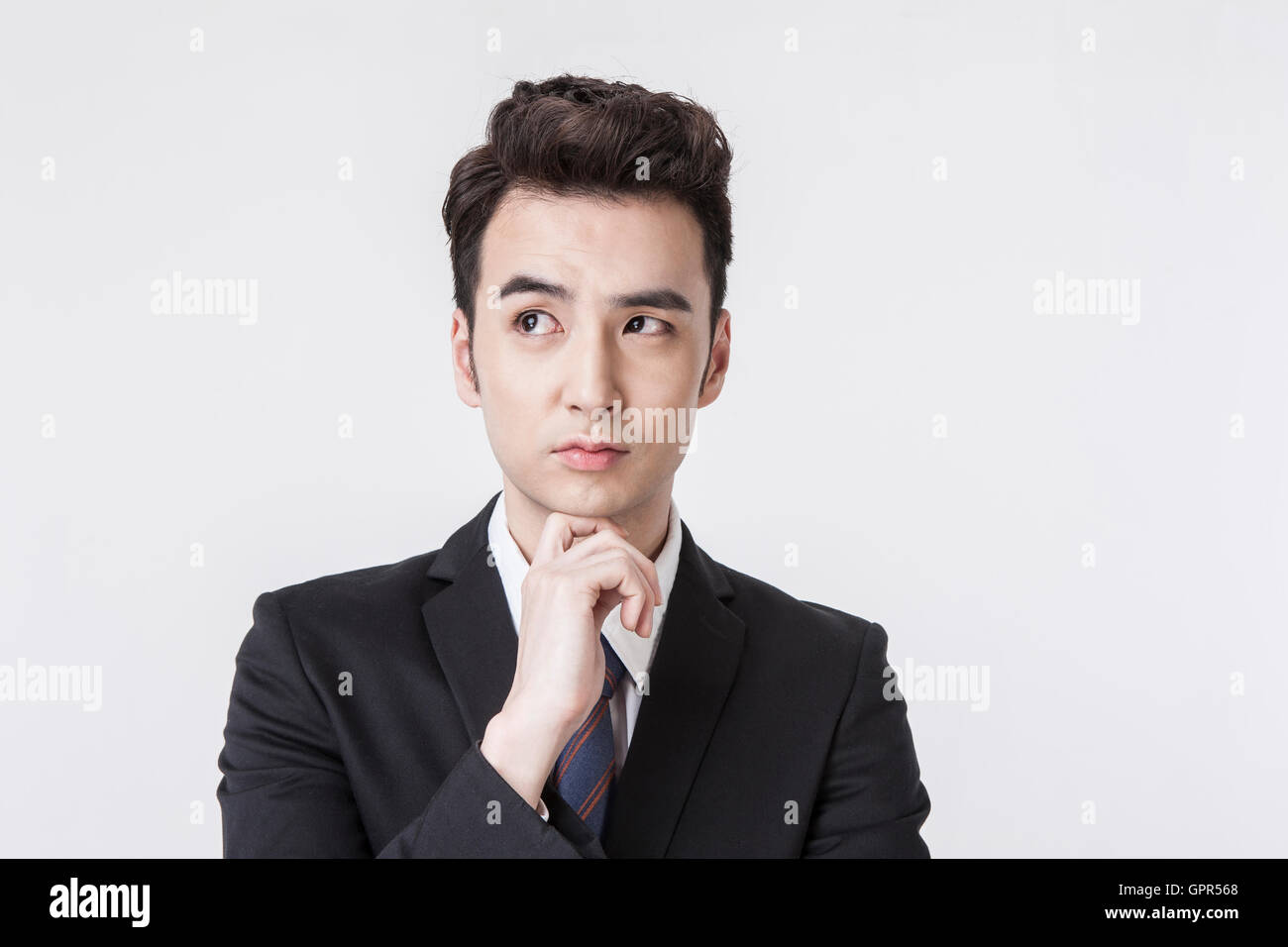 Frowning businessman hi-res stock photography and images - Alamy